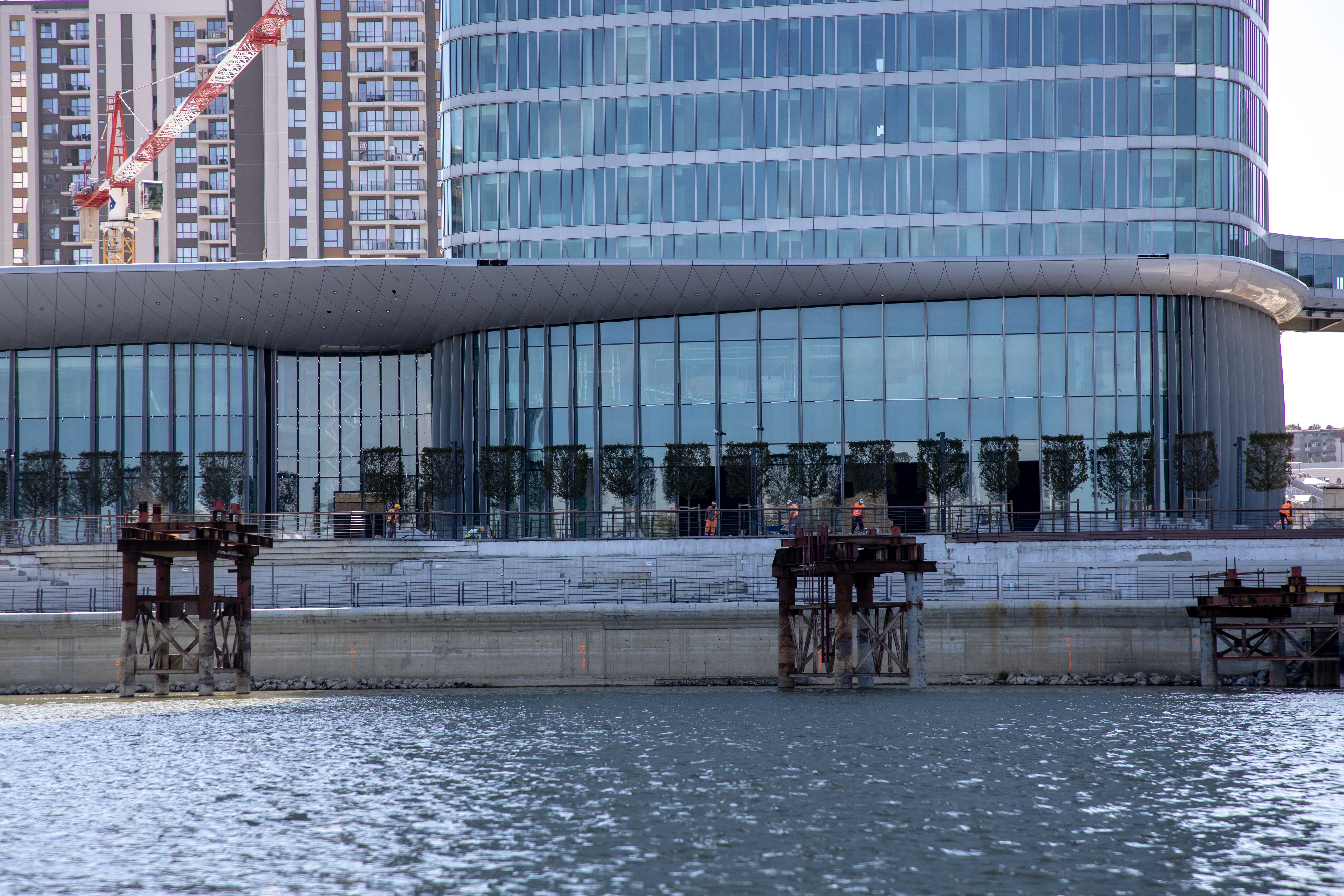 Construction of a Modern Building at a Harbor · Free Stock Photo
