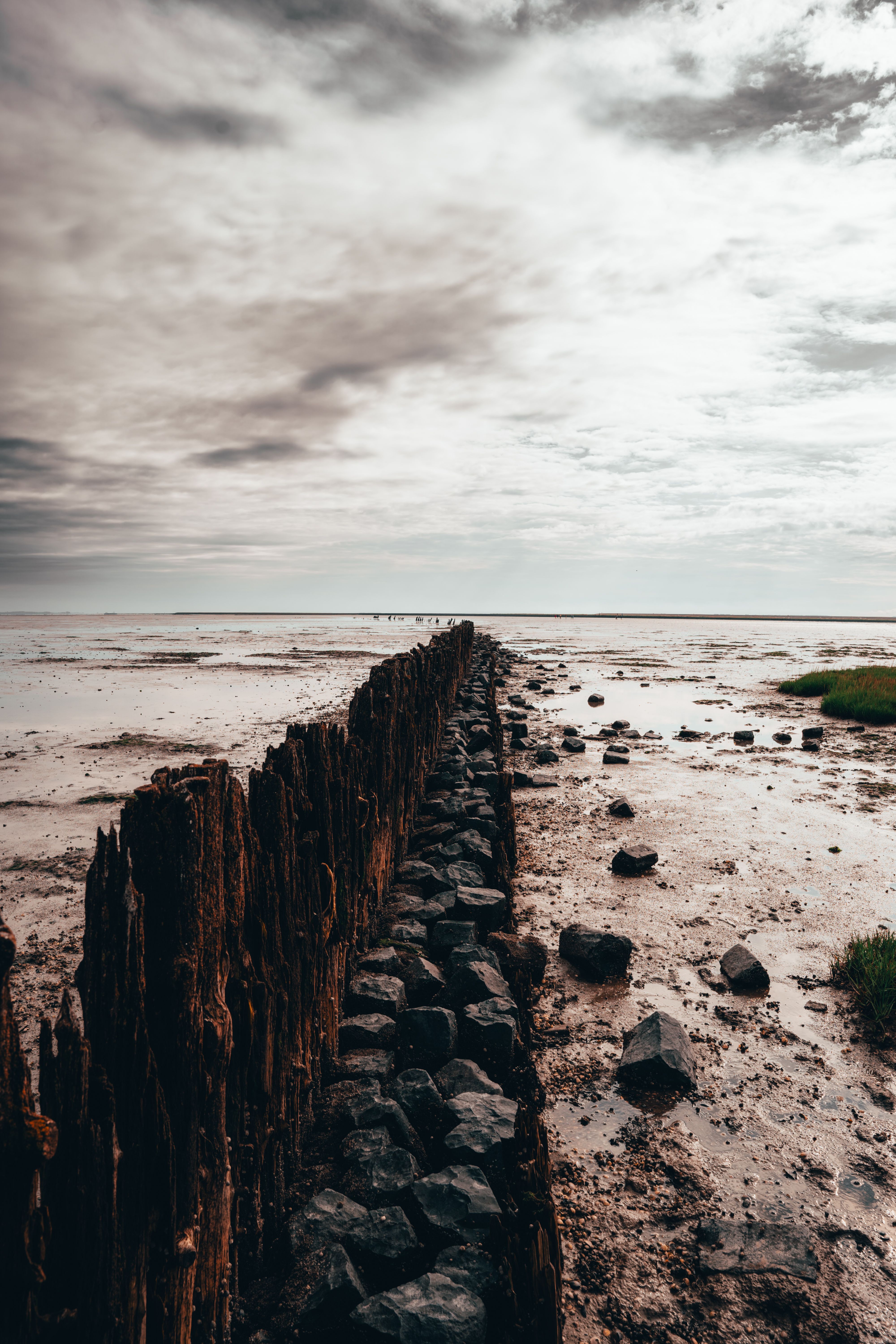 Wooden and Rocky Breakwater · Free Stock Photo