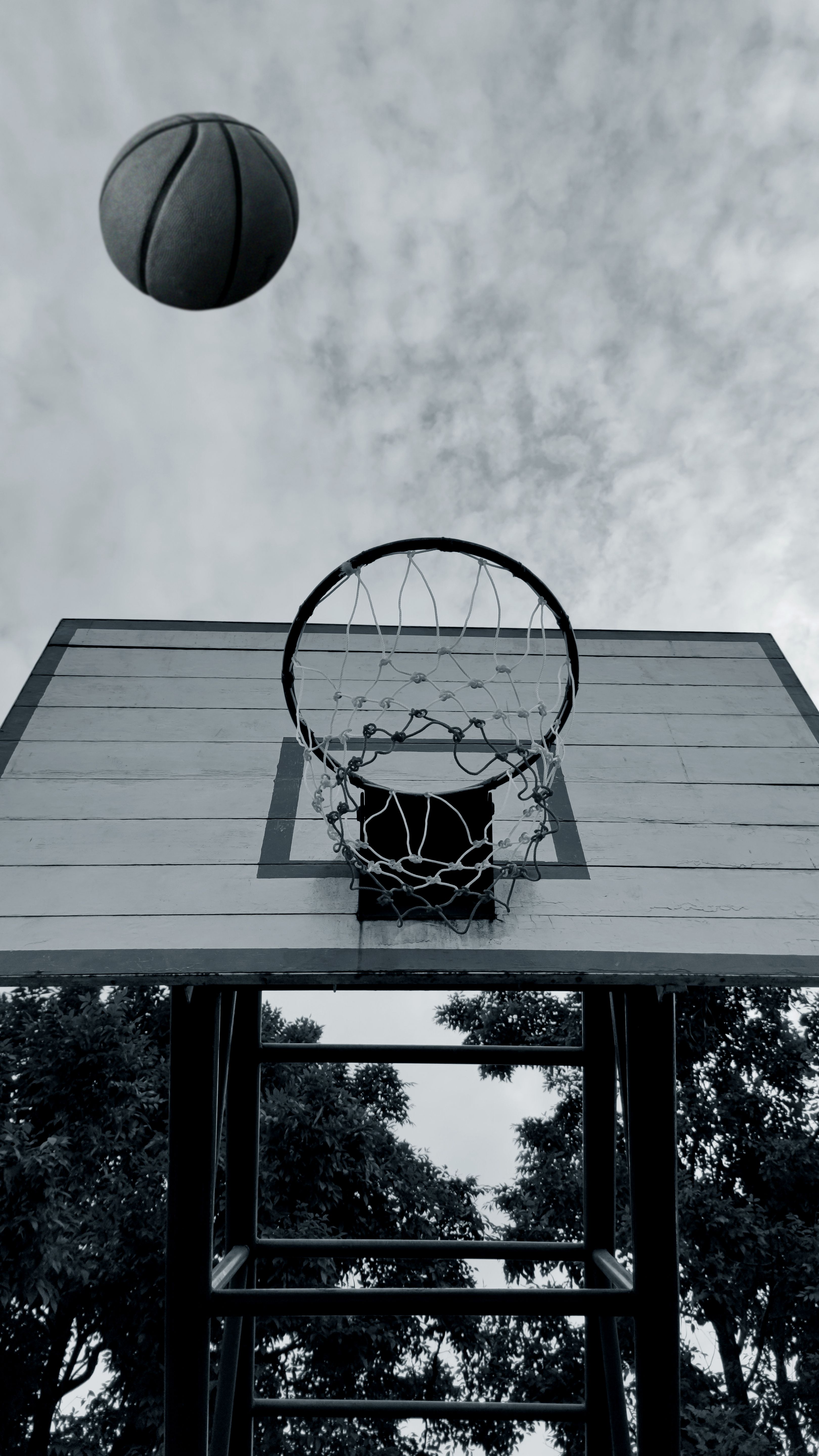 Ball Flying over Basketball Ring · Free Stock Photo