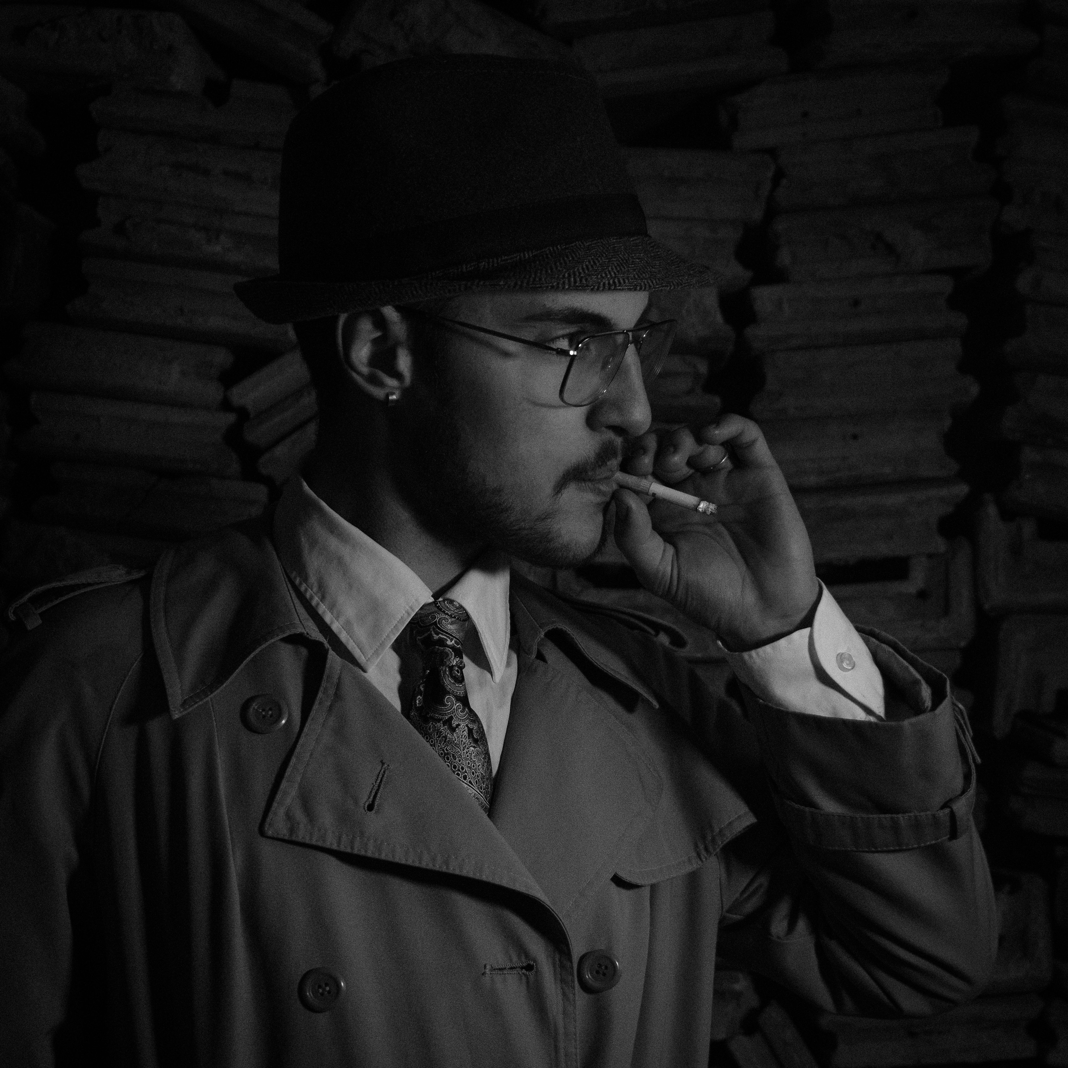 Man in Retro Clothing Smoking Cigarette · Free Stock Photo