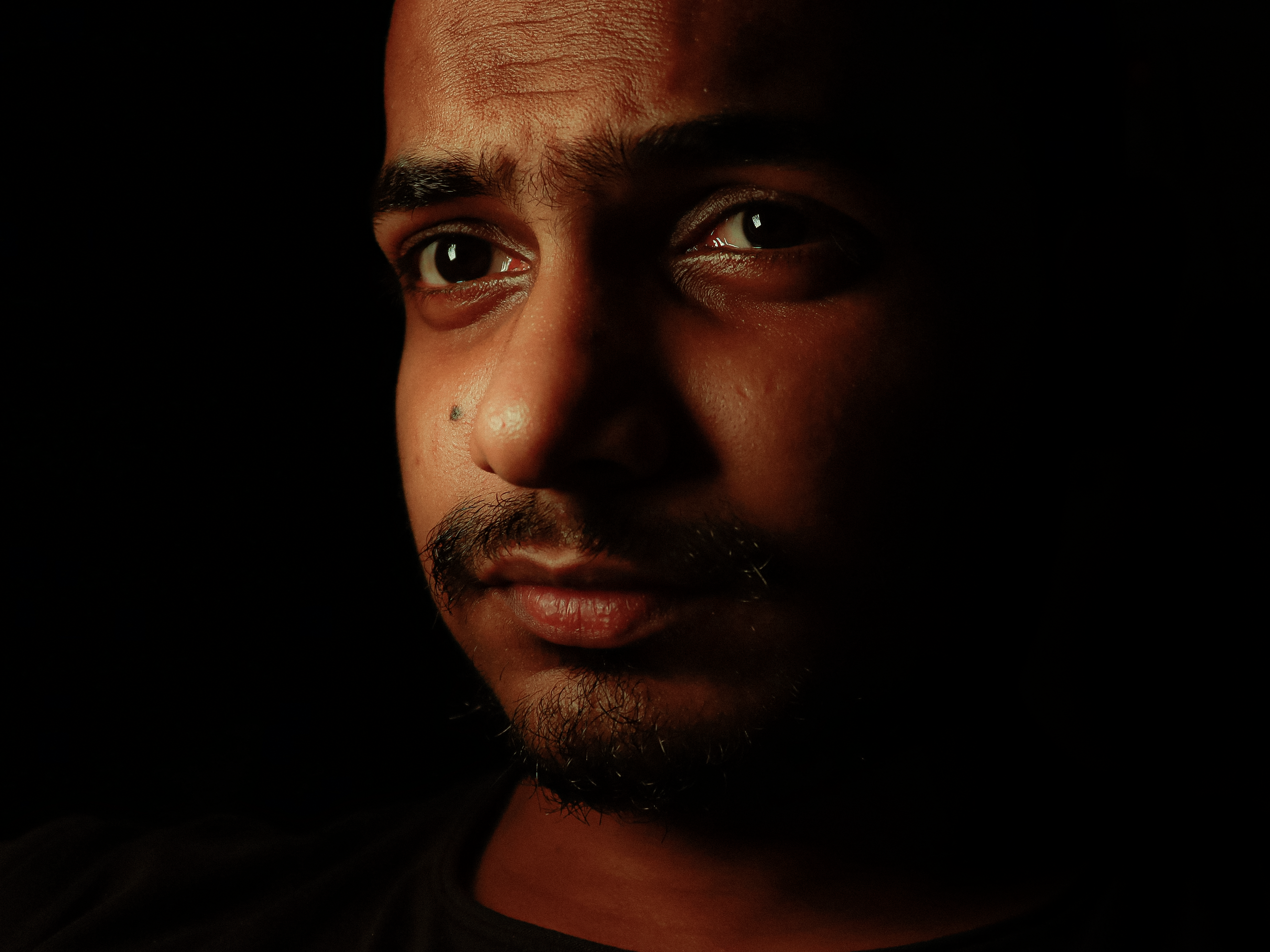 Portrait of a men with black background · Free Stock Photo