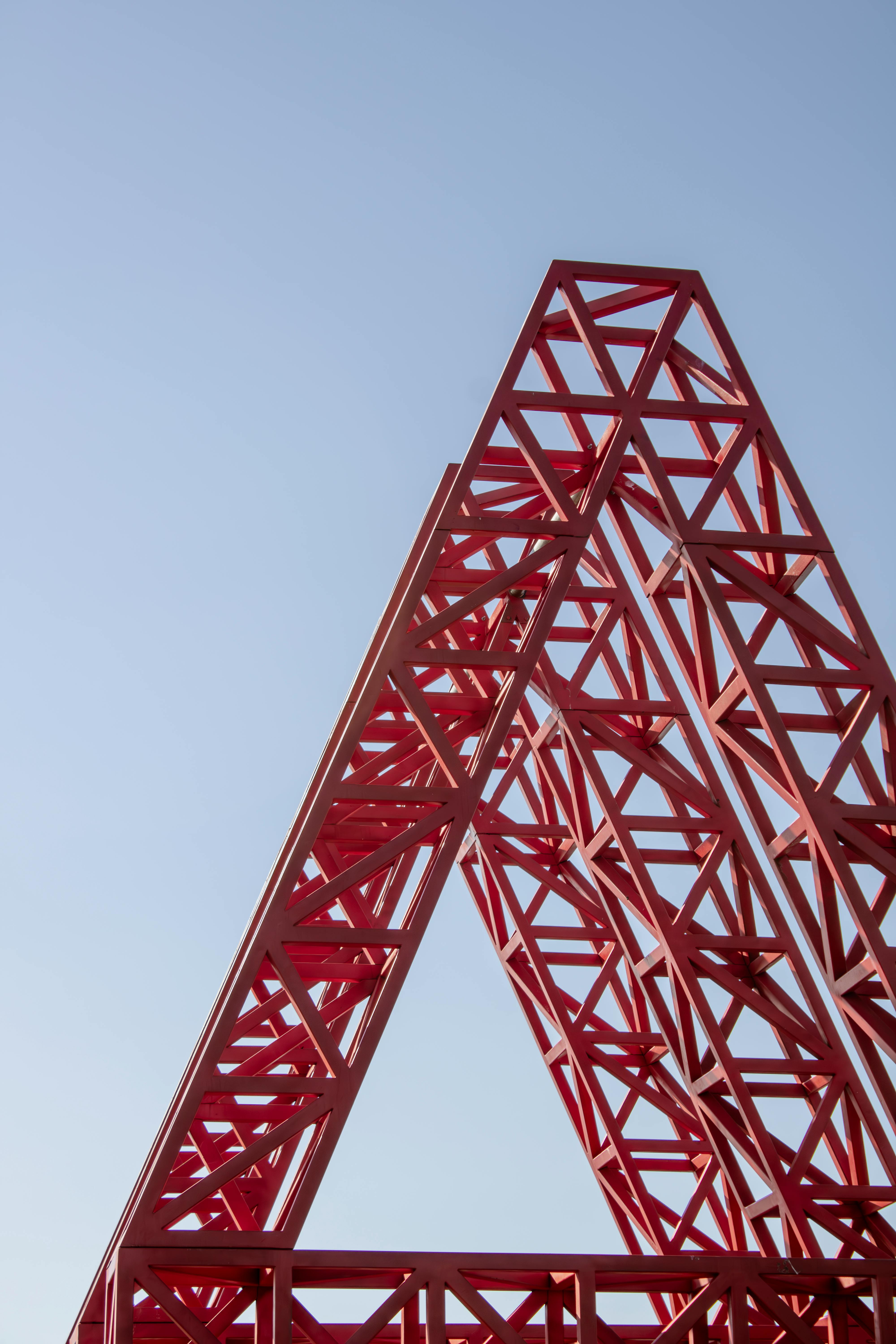 Red Steel Structure against Clear Sky · Free Stock Photo