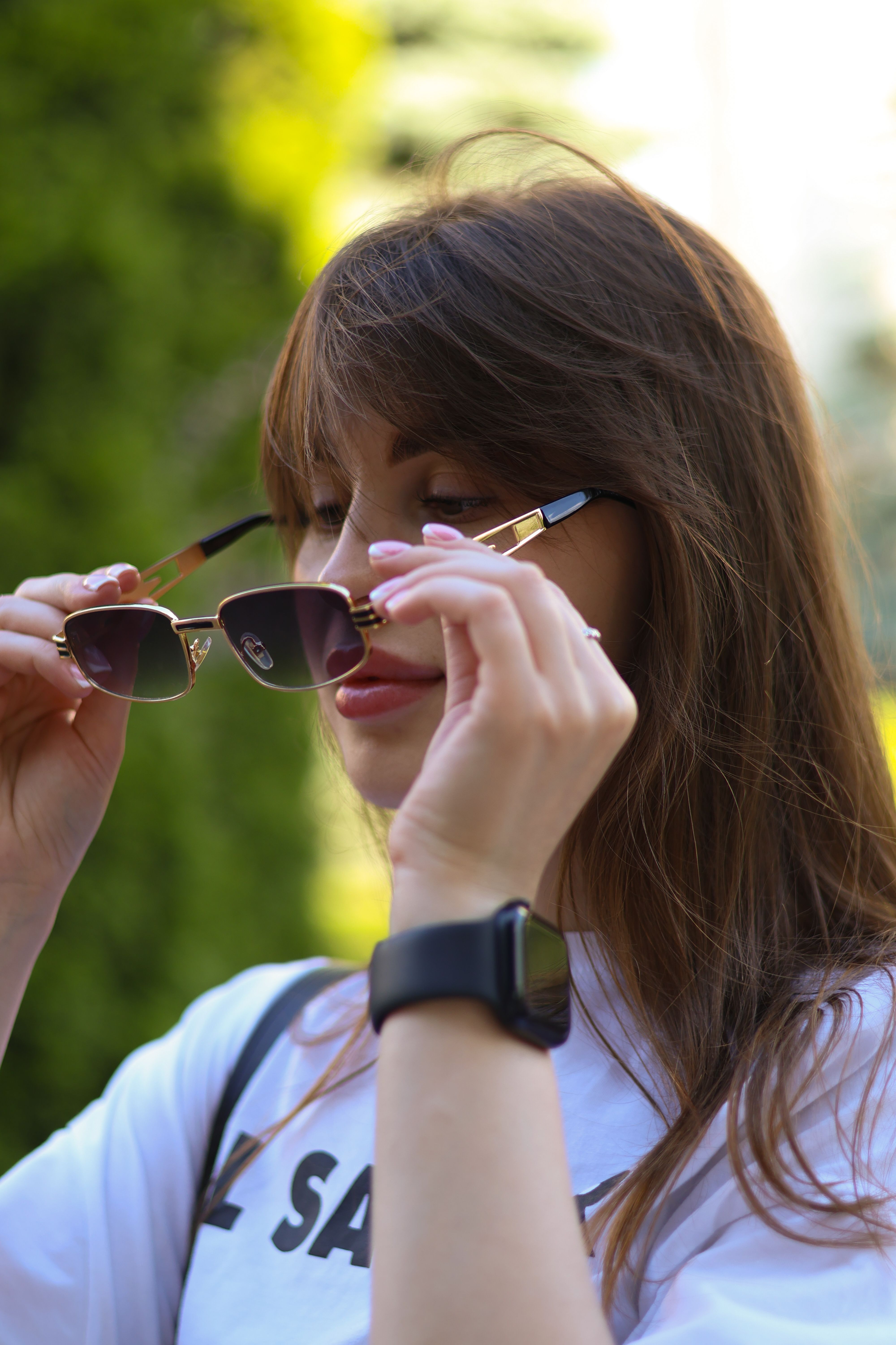 Woman Taking Off Sunglasses · Free Stock Photo