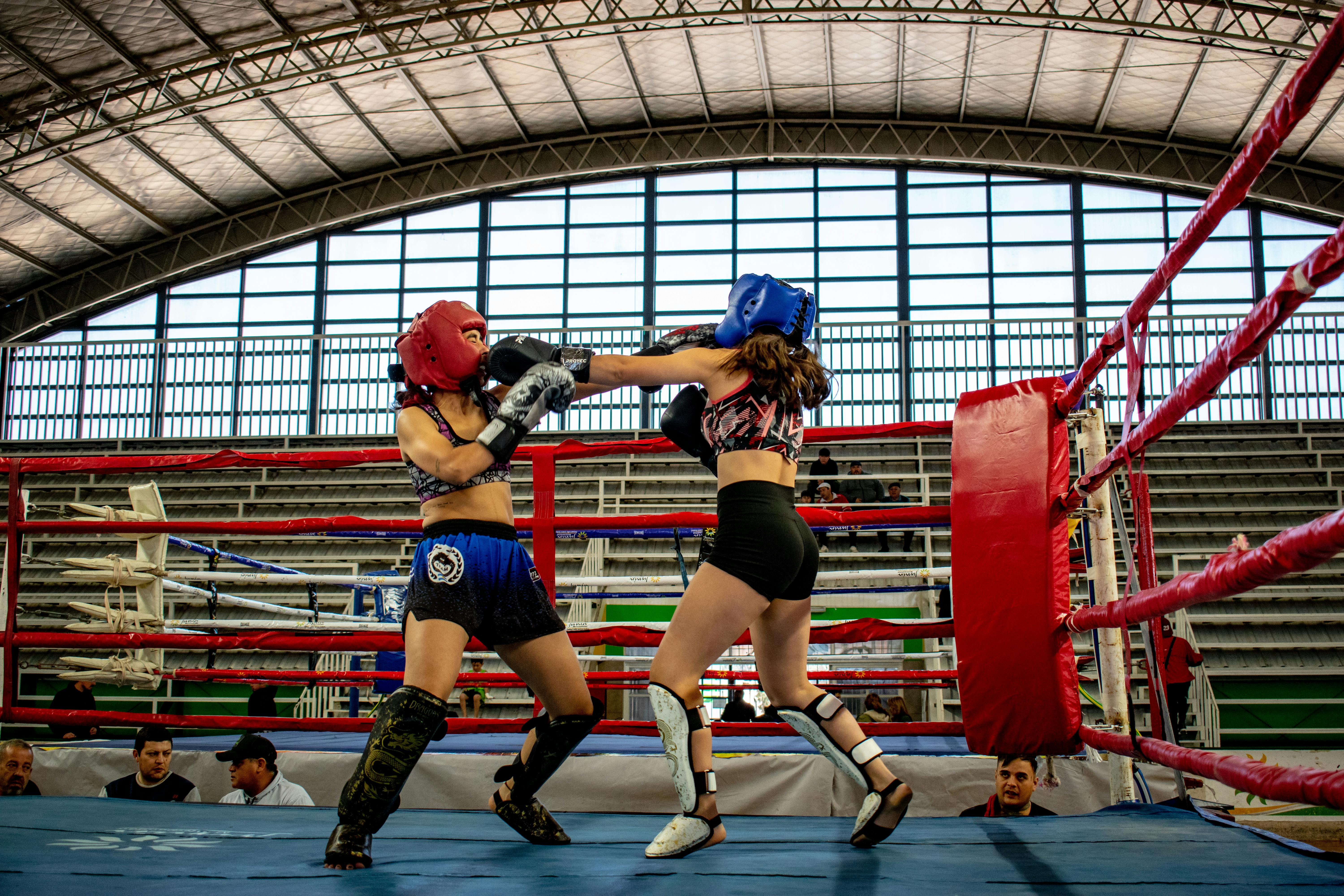 Women Kickboxing in Ring · Free Stock Photo