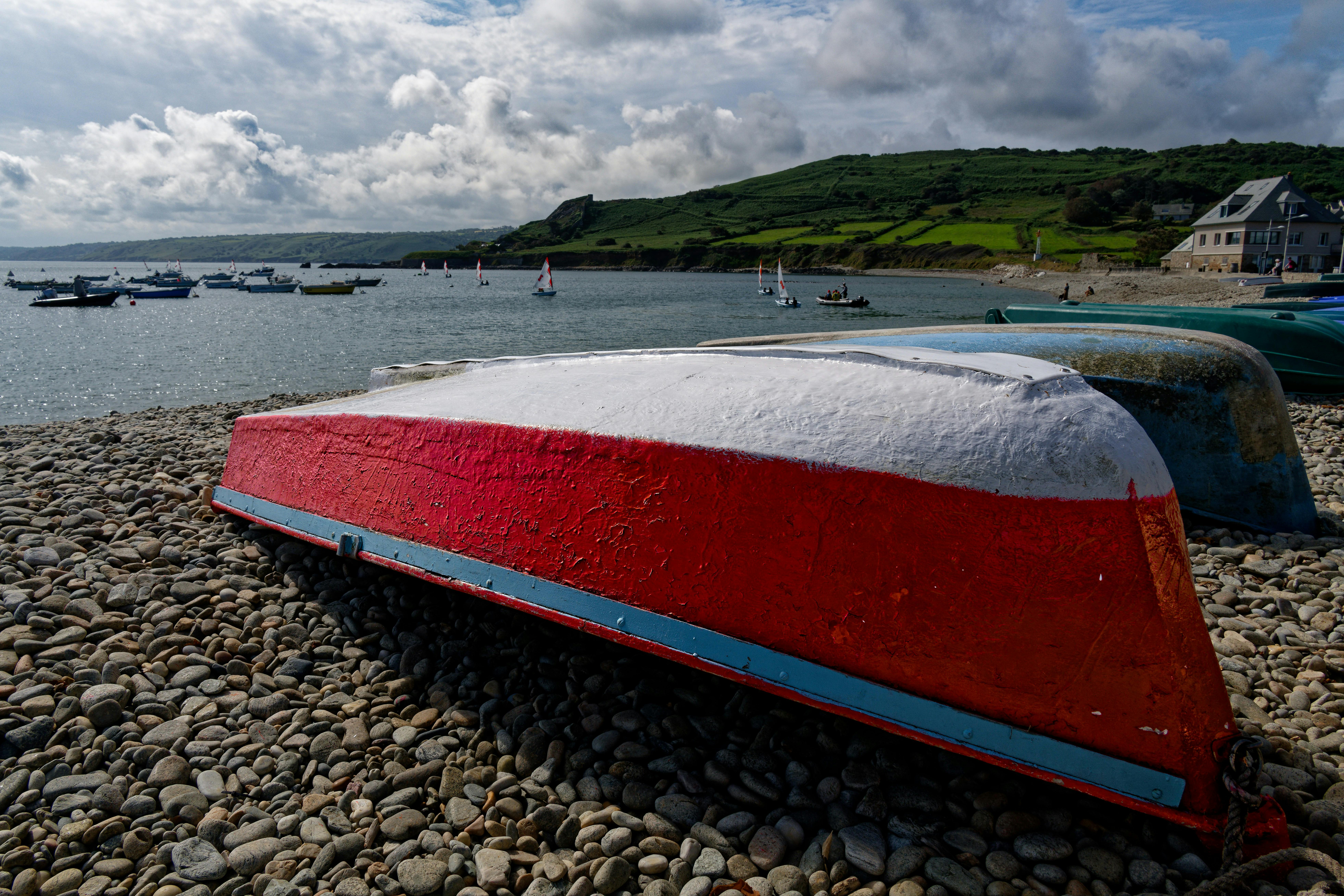 Flipped Over Boats on Beach · Free Stock Photo
