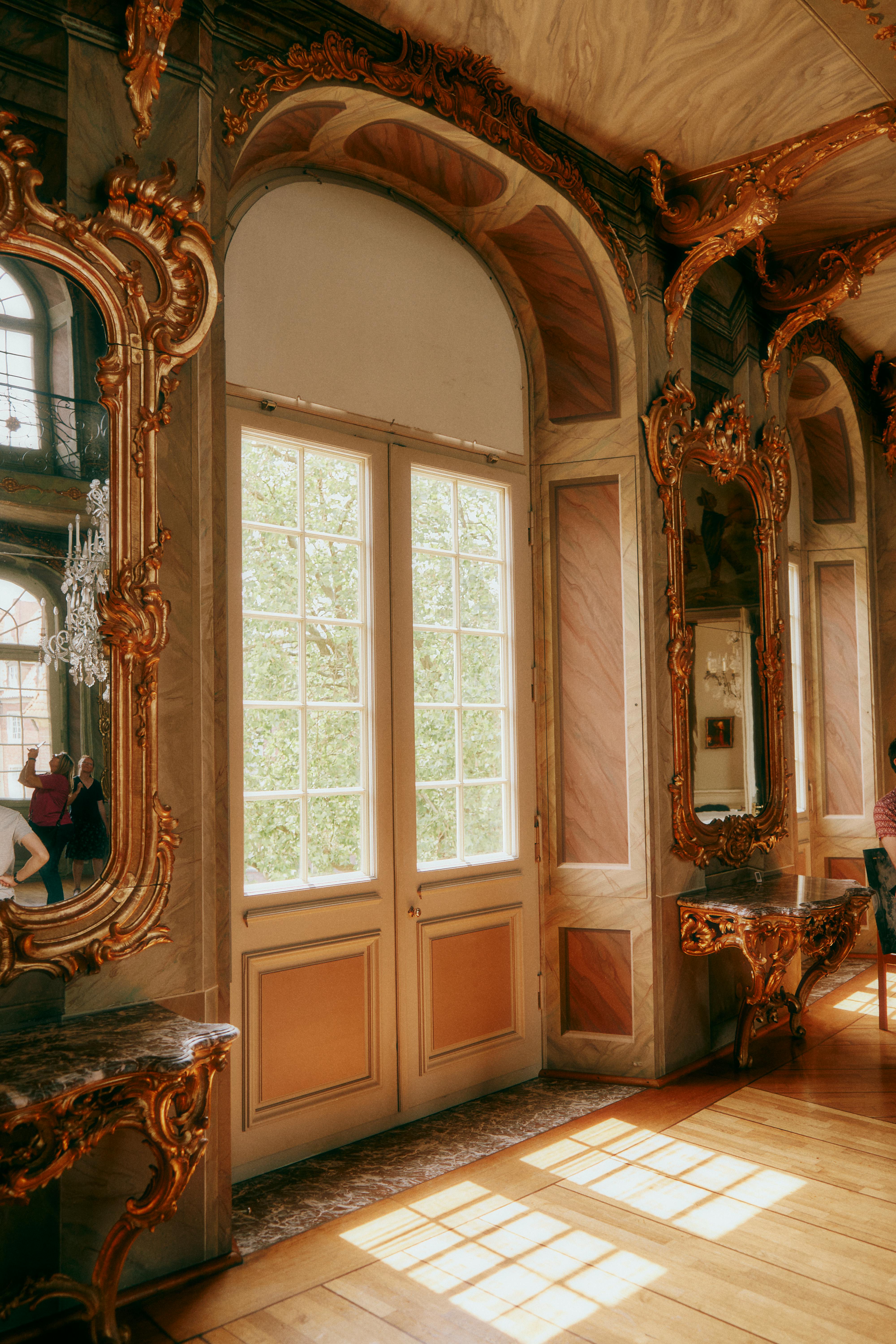 Ornamented Mirrors near Windows · Free Stock Photo