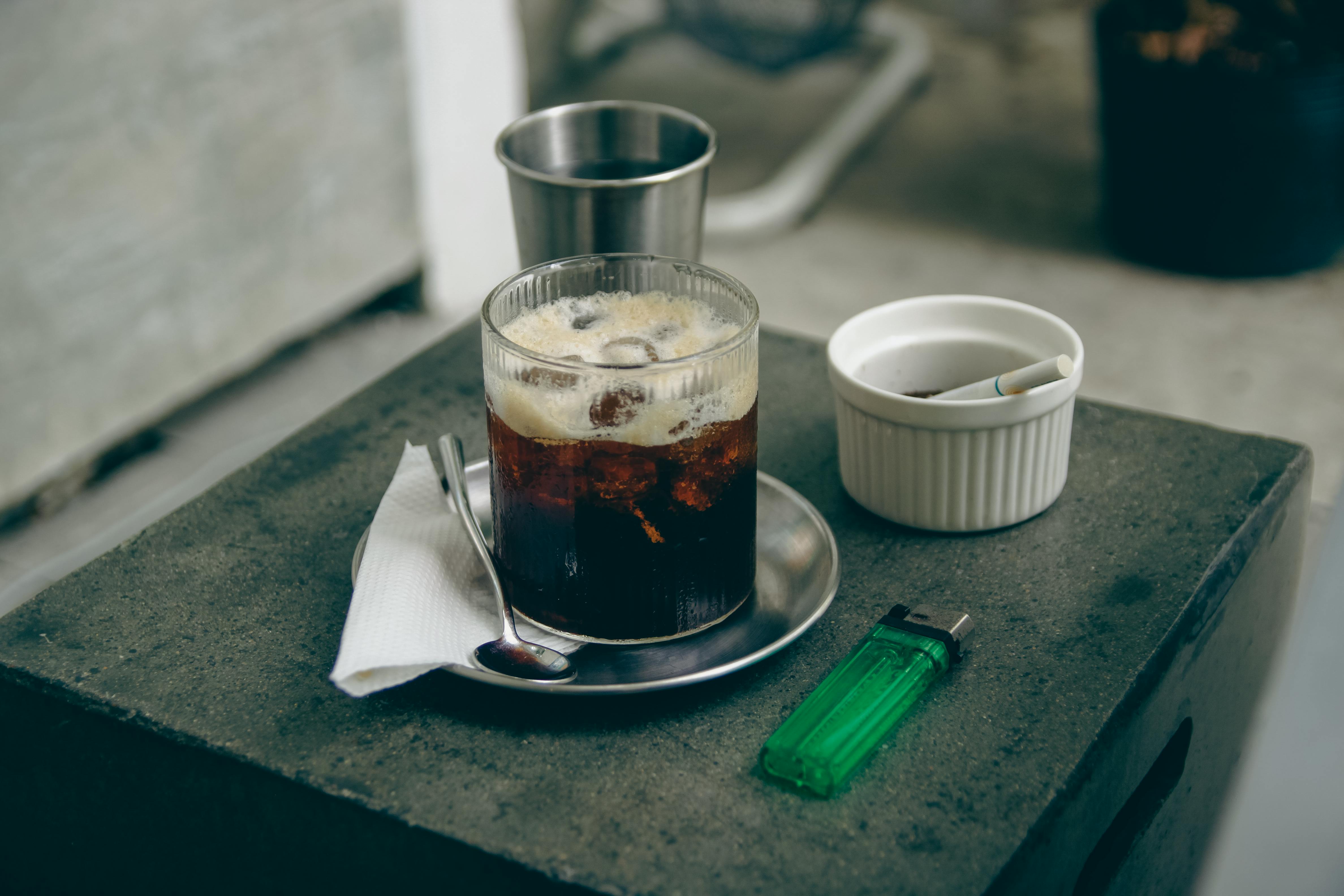 Closeup Photo of Liquor Bottle Against Black Background · Free Stock Photo
