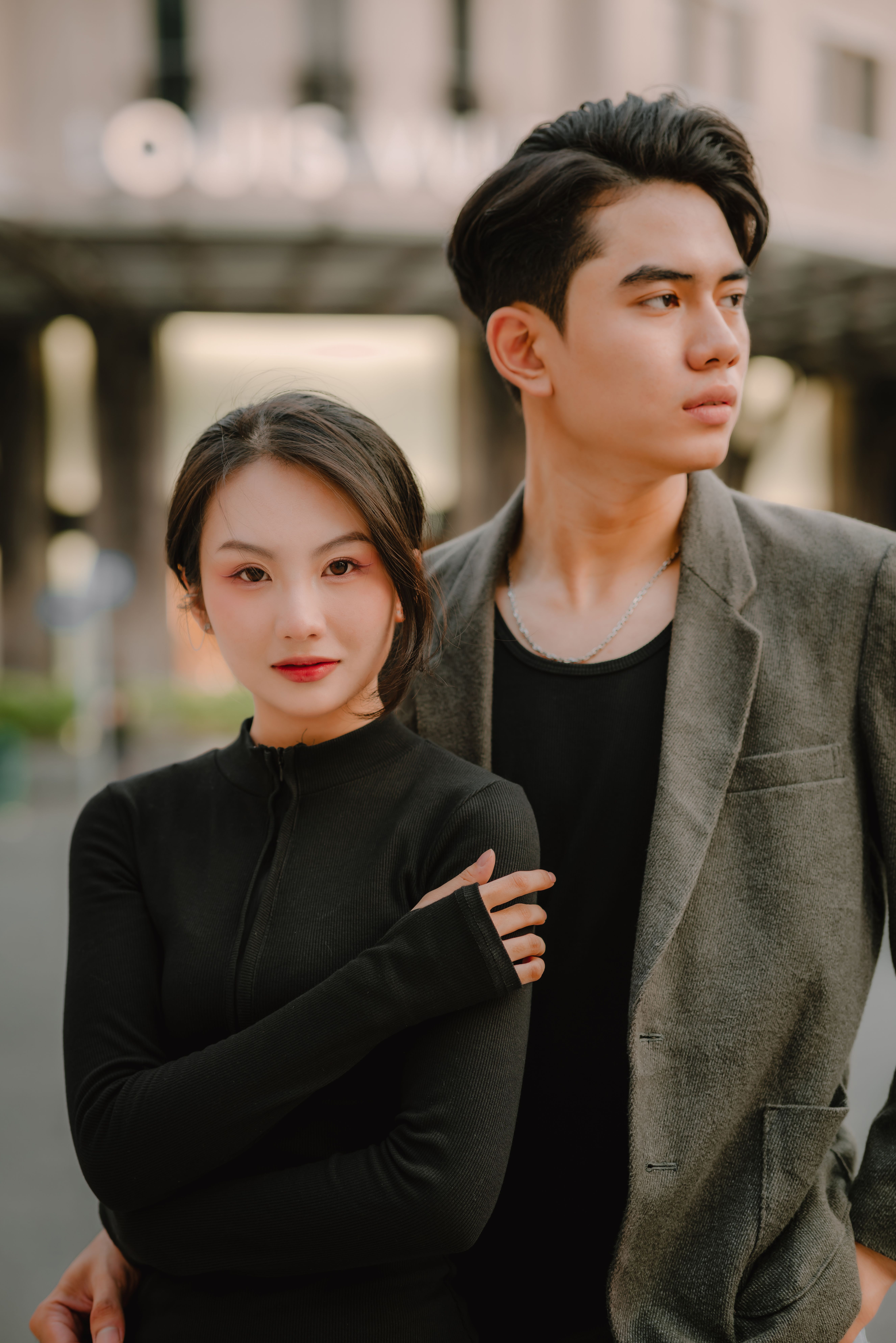 Young Couple Standing Close Together · Free Stock Photo