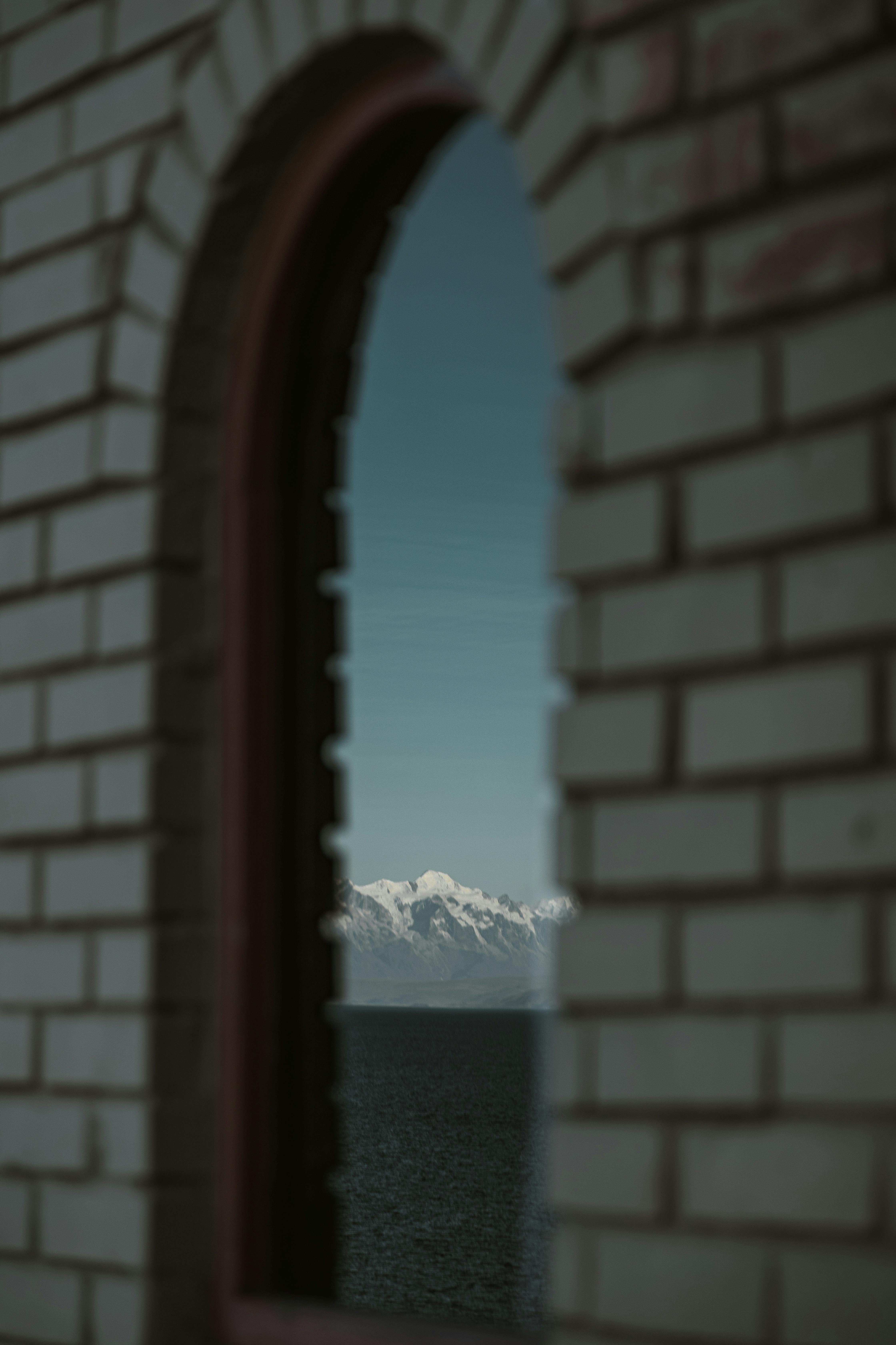 Three Awning Windows on Plain Wall · Free Stock Photo