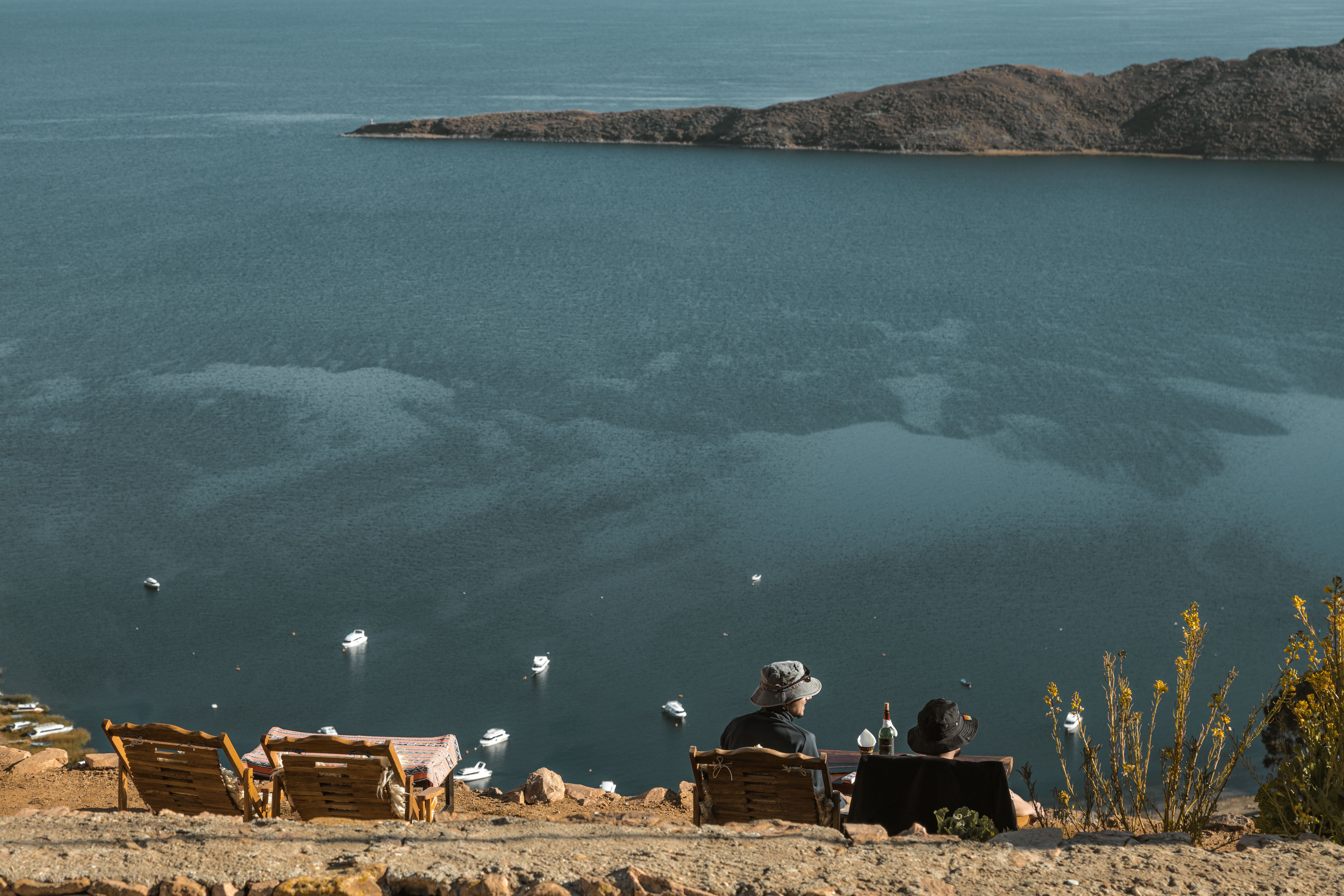 Sitting On Rock Dangling Photos, Download The BEST Free Sitting On Rock ...