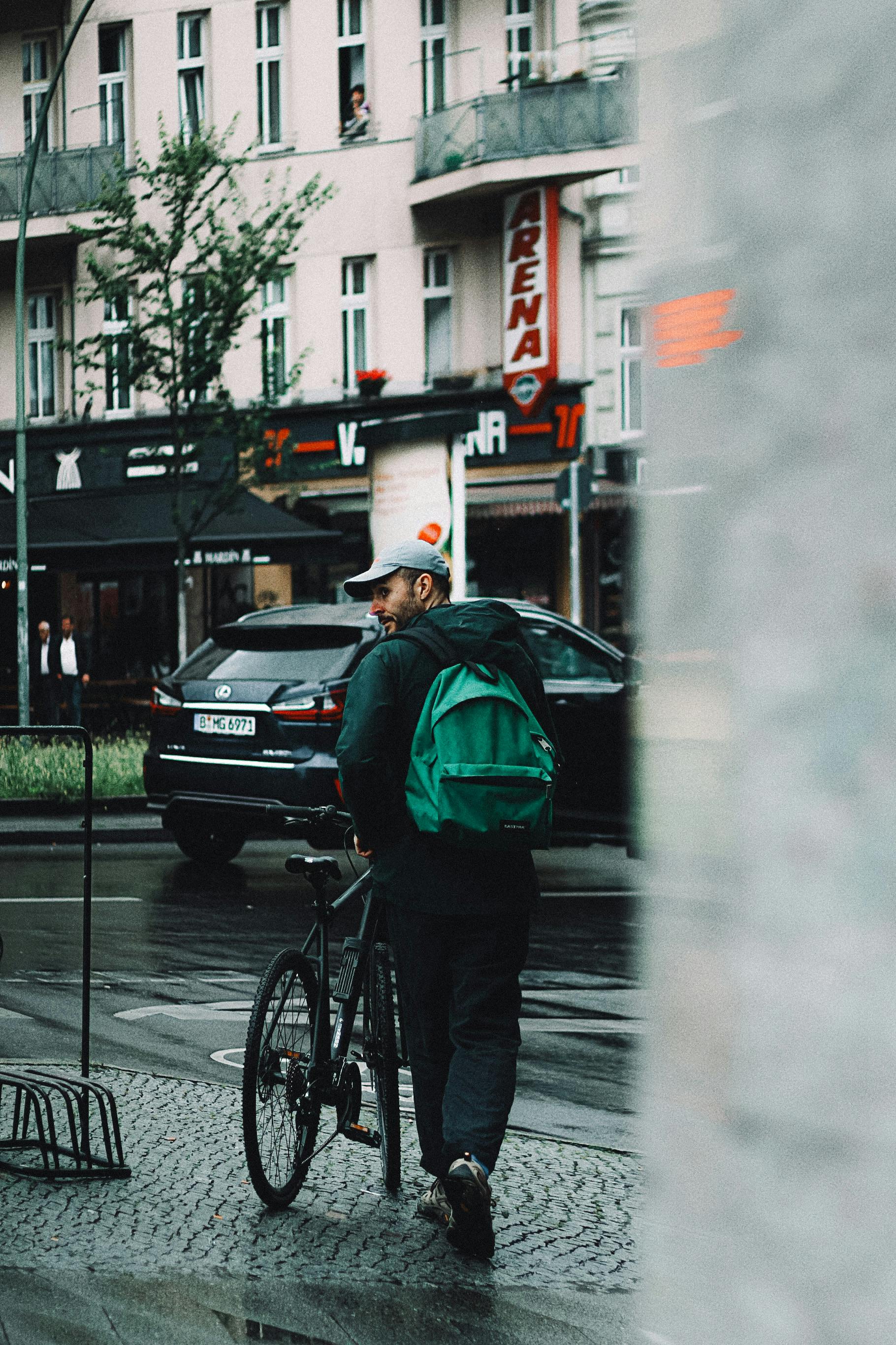 Man Walking with Bike in Rain · Free Stock Photo