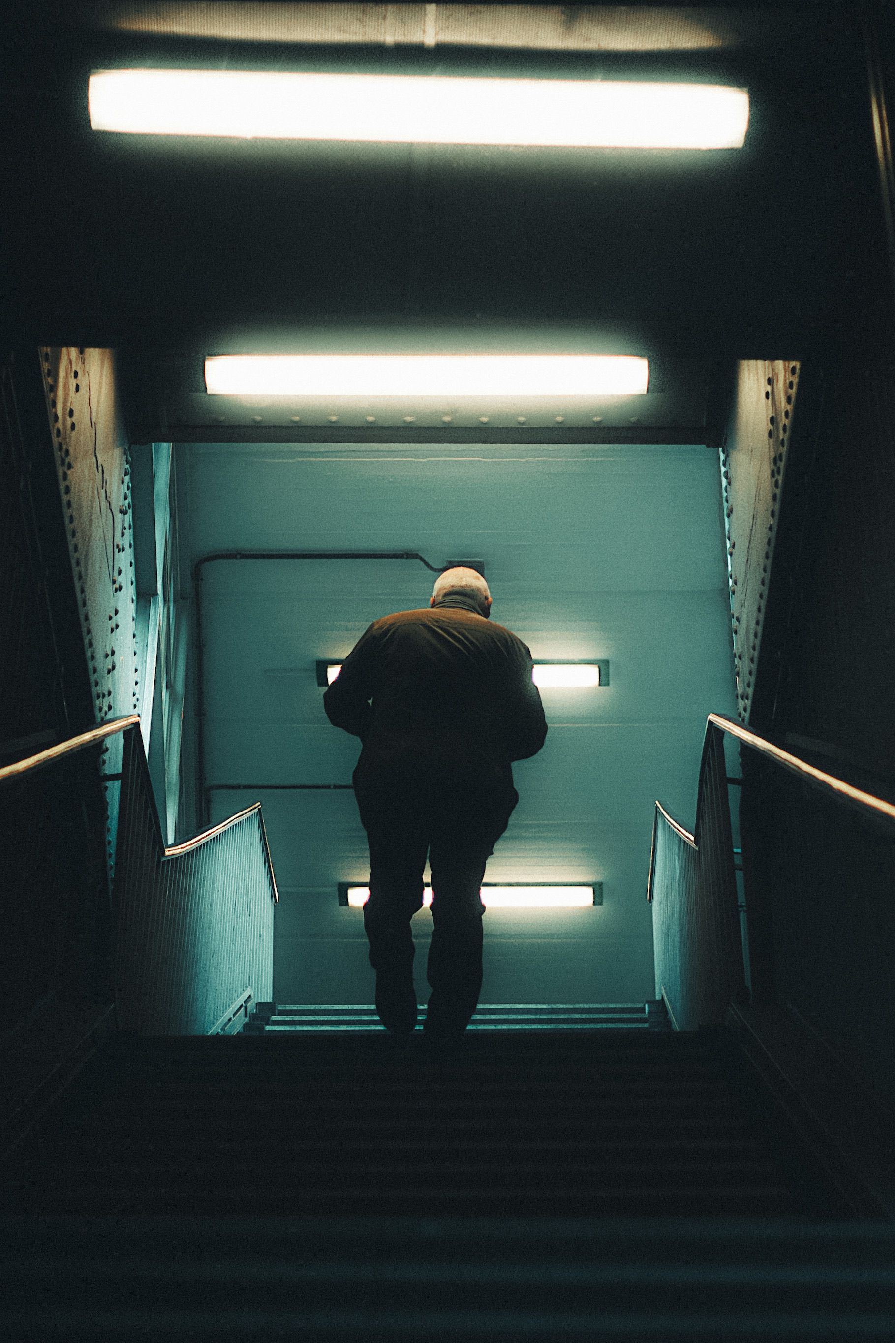 Man Walking Upstairs at Night · Free Stock Photo