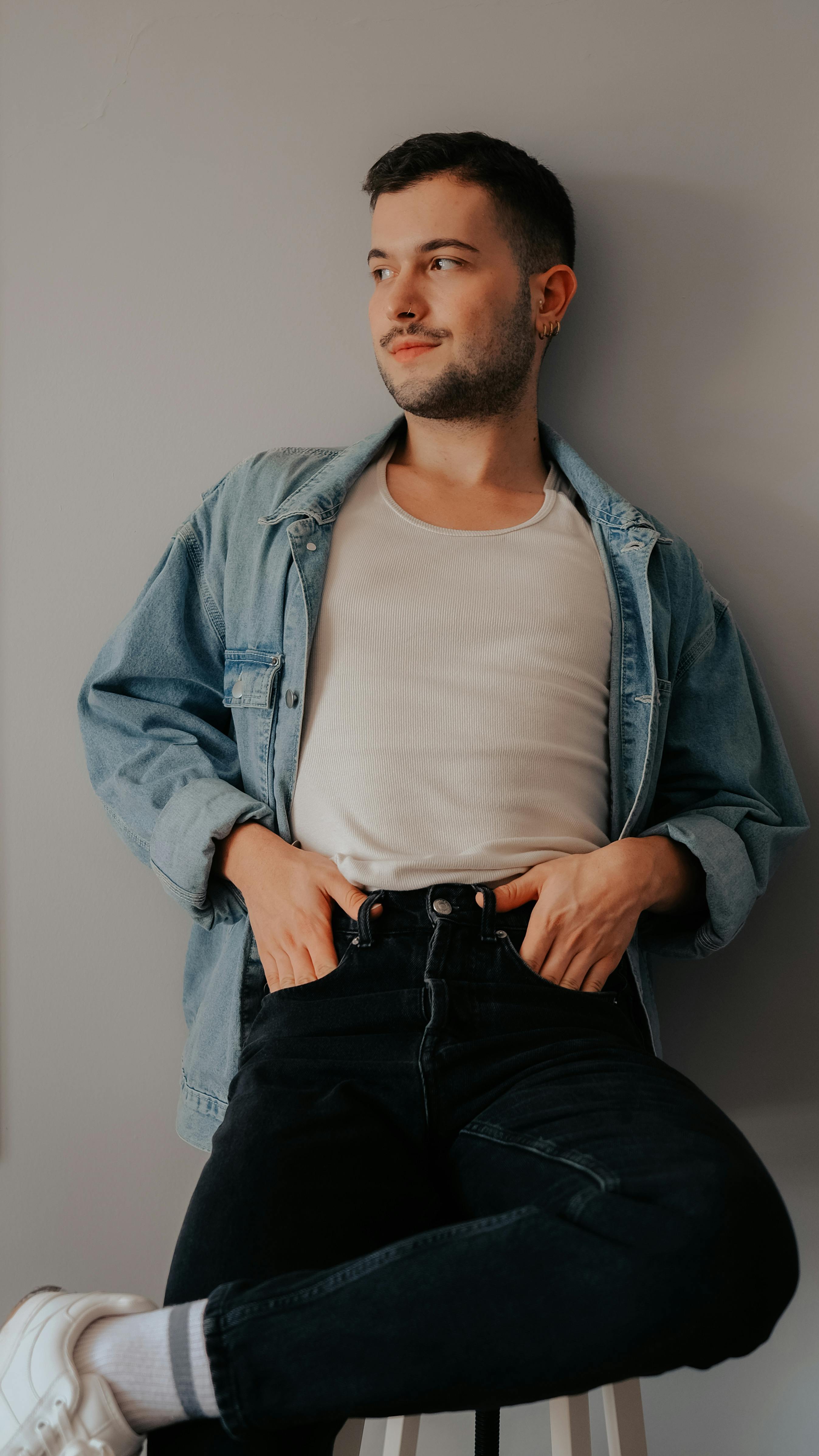 Man Posing in Denim Jacket · Free Stock Photo