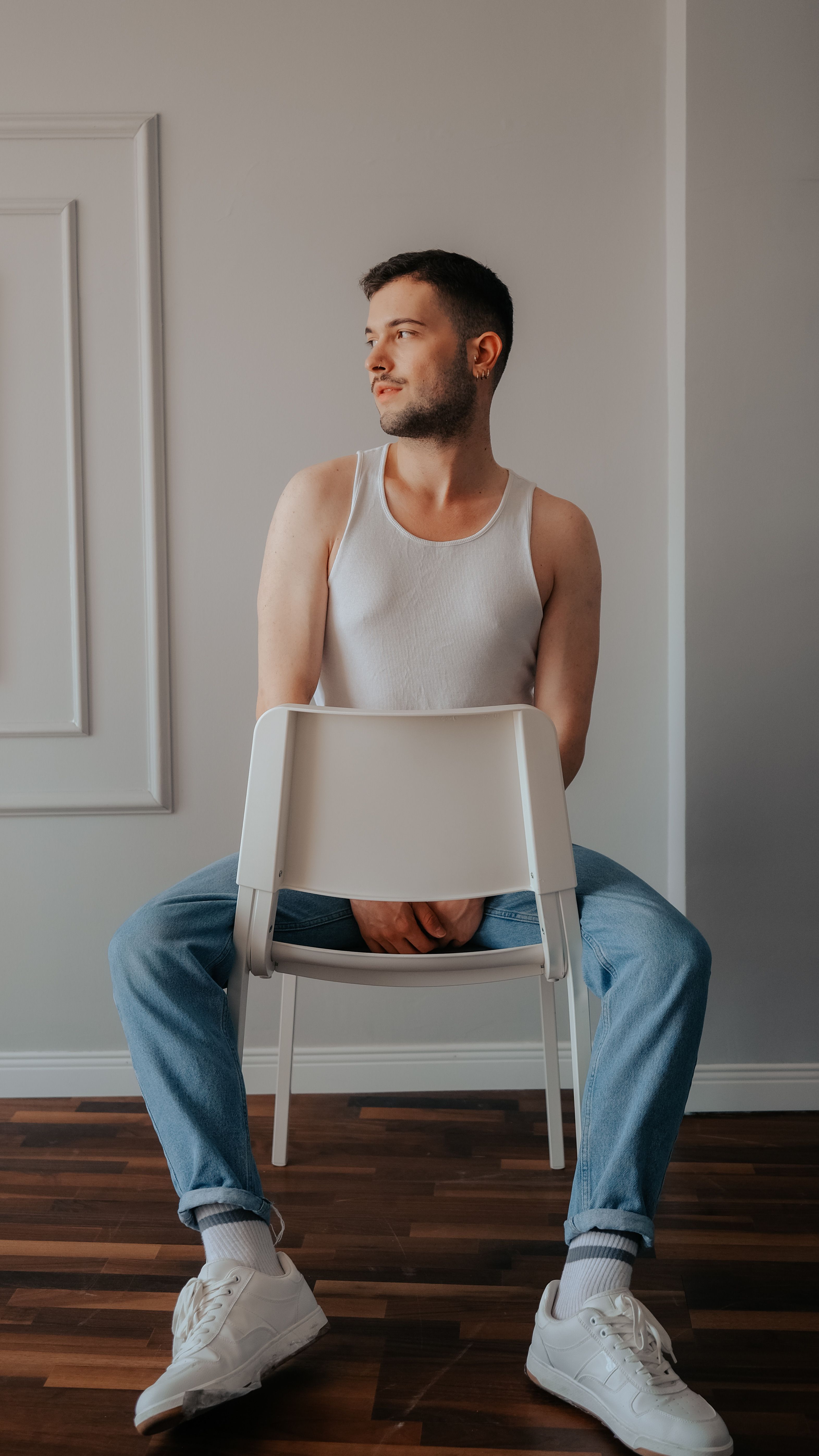 Man Posing on a Chair · Free Stock Photo