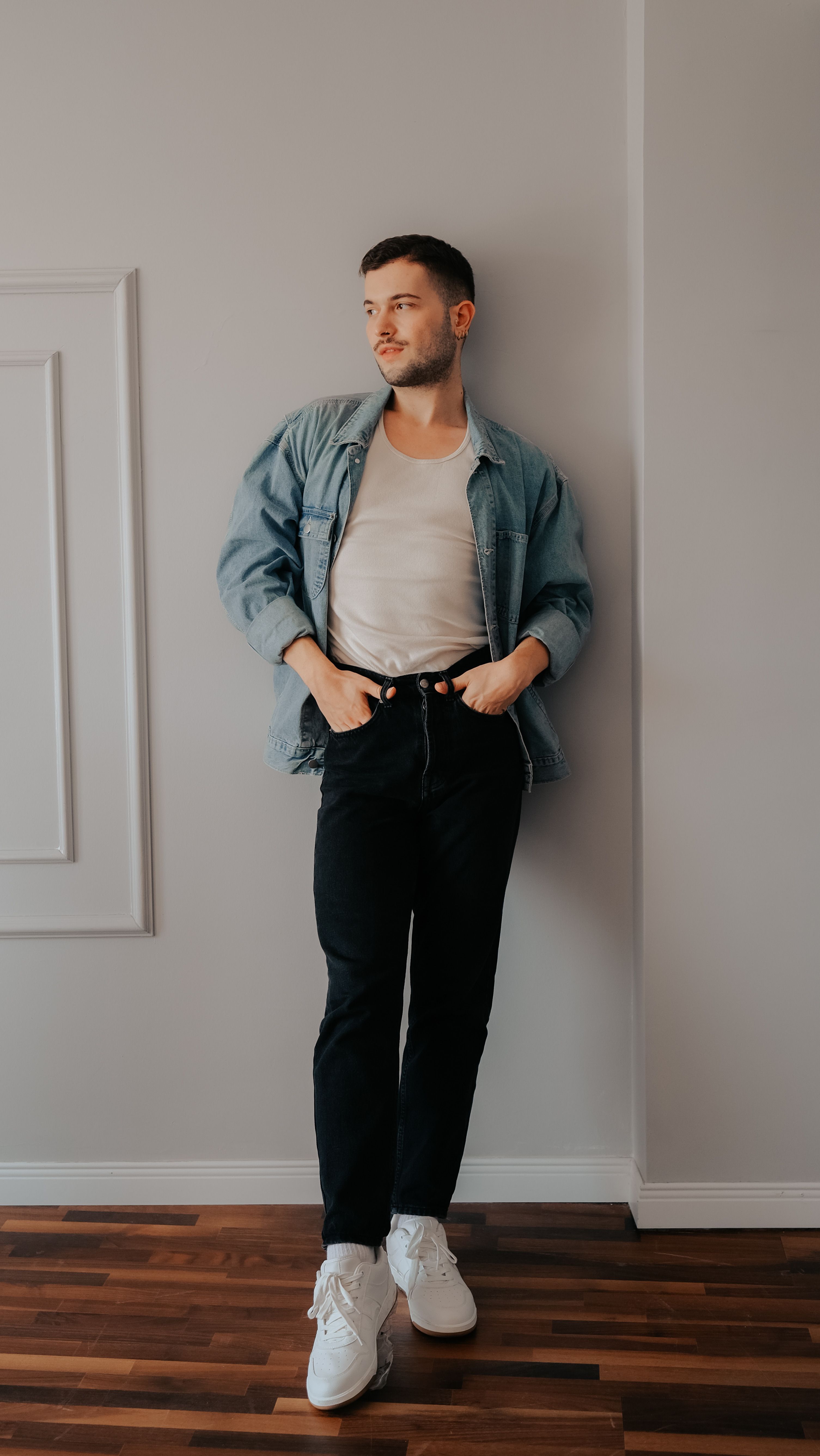 Man Posing in Denim Jacket · Free Stock Photo