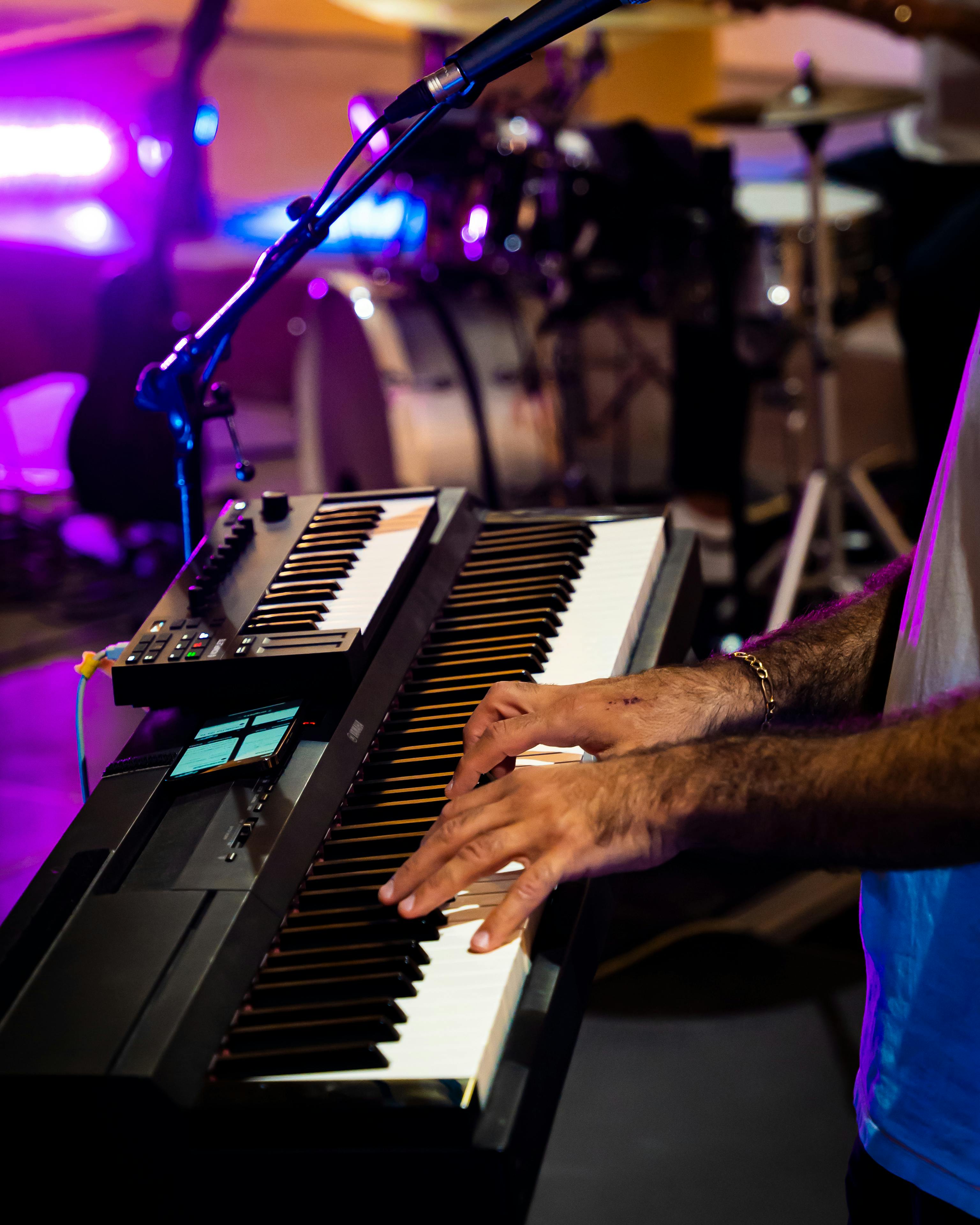 Man Playing on Keyboard · Free Stock Photo