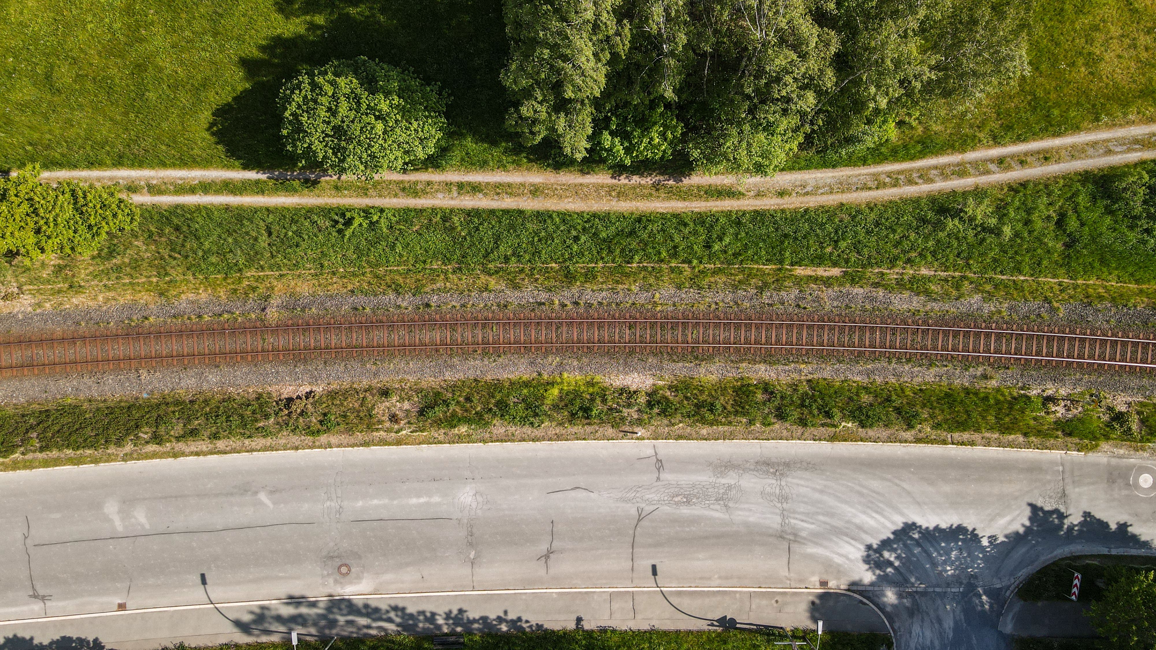 Track between Path and Road · Free Stock Photo