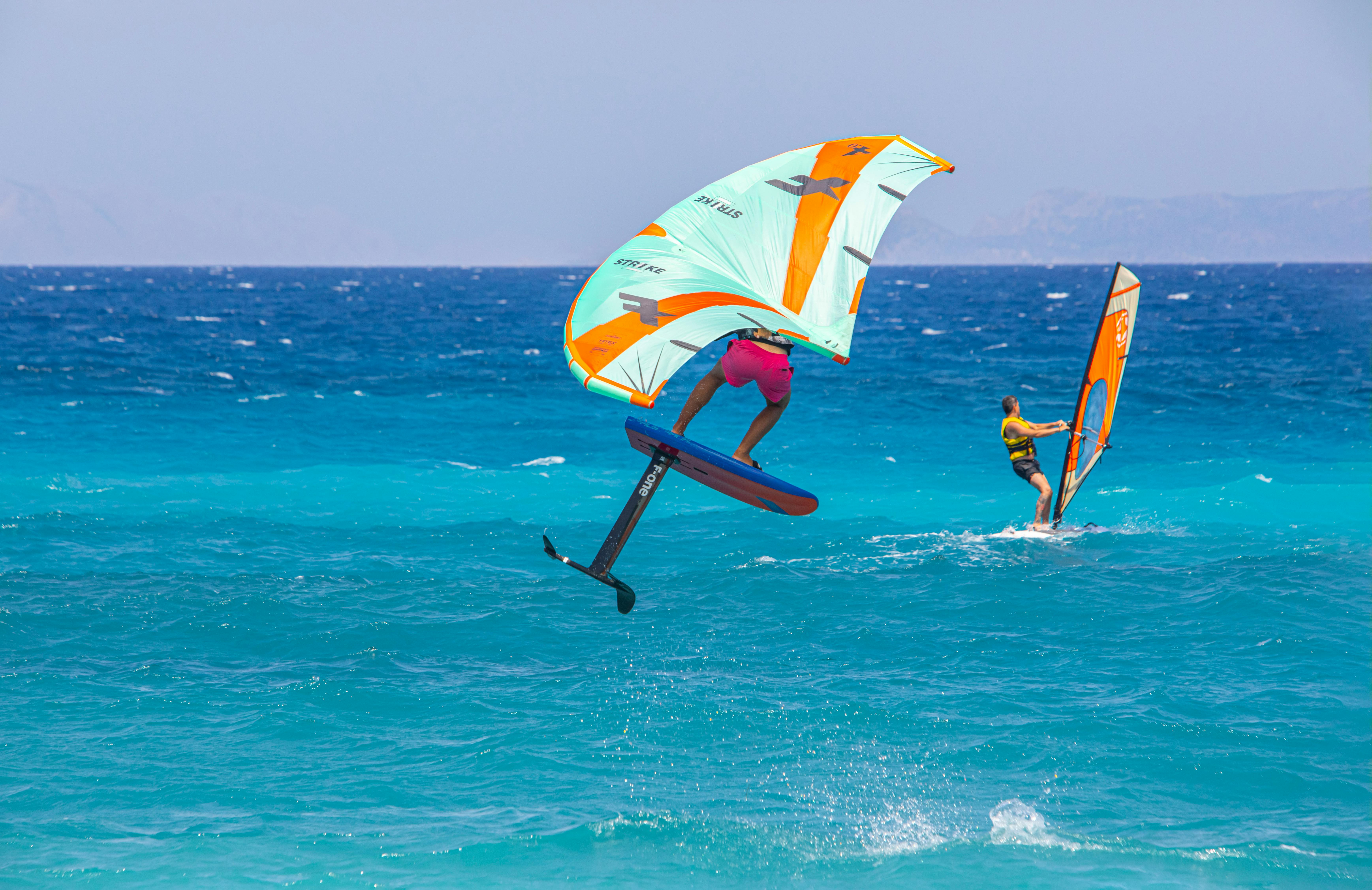 People Wing Foiling on Vacation · Free Stock Photo