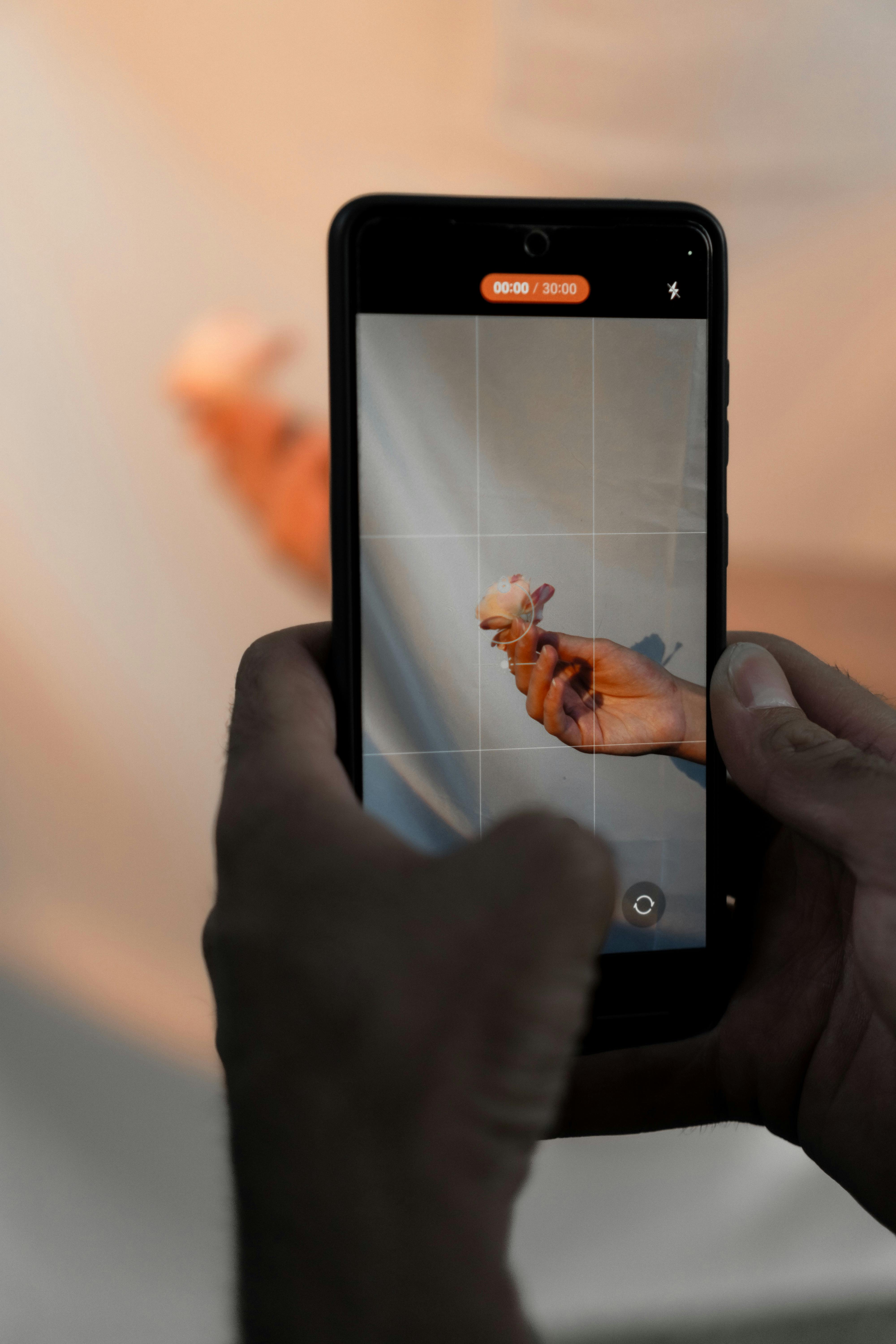 Hands Recording Video with Smartphone · Free Stock Photo
