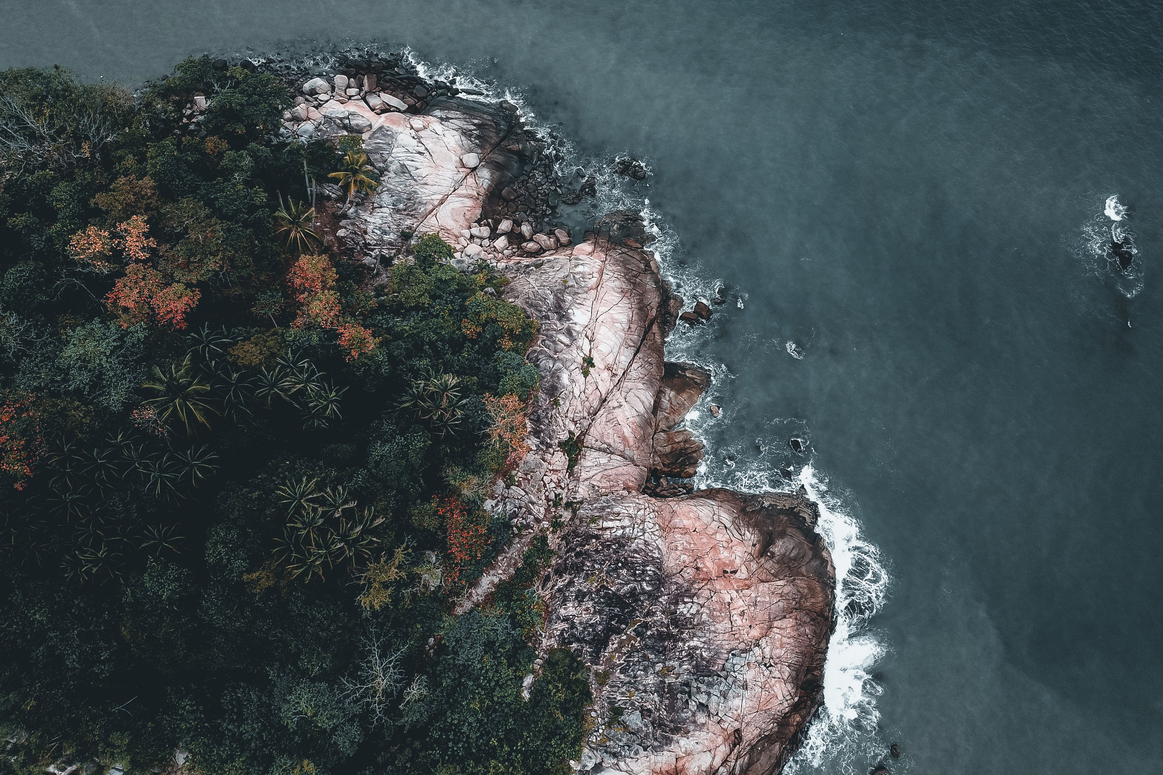 Aerial View of a Cave on a Coast · Free Stock Photo