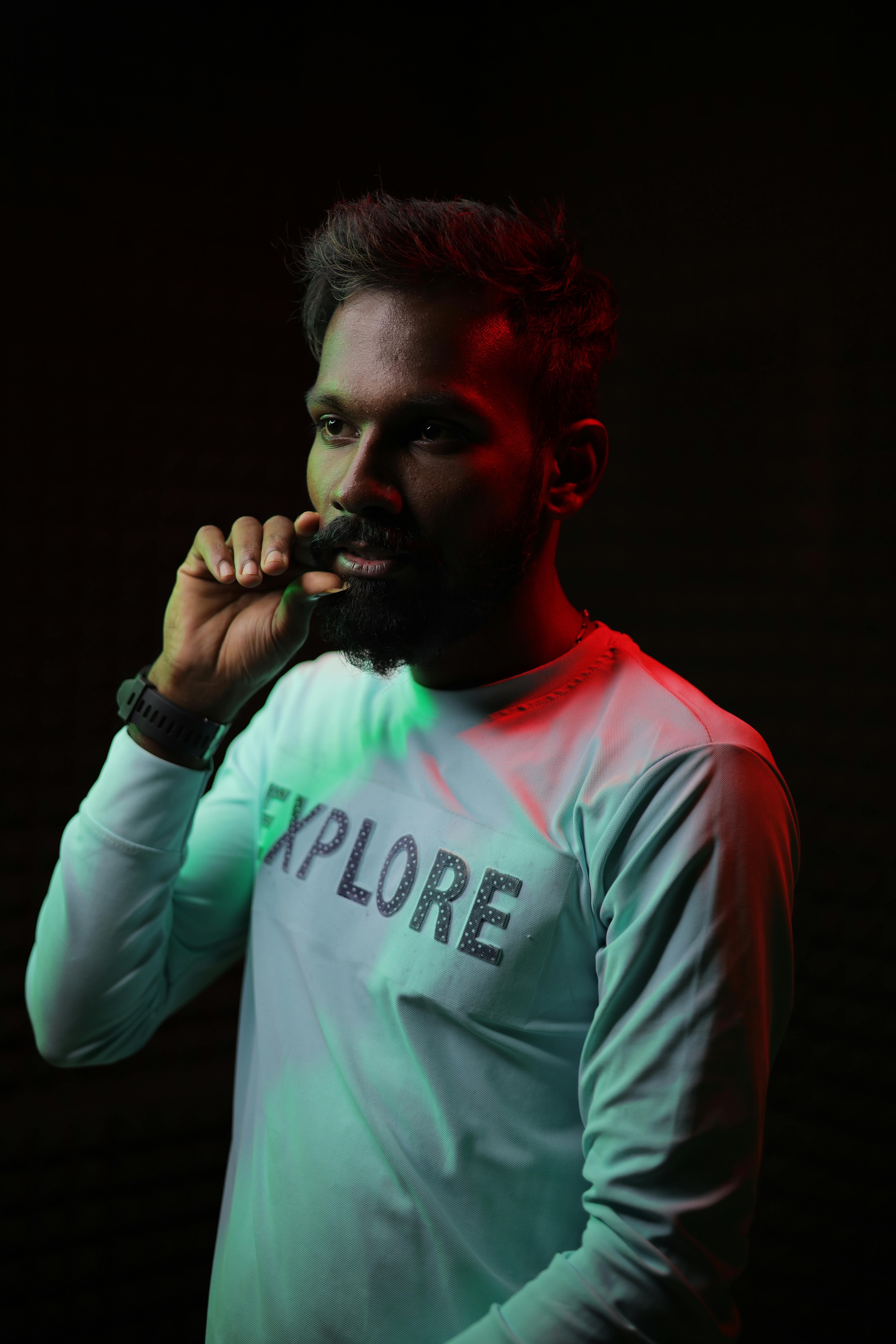 Standing Man Fixing Mustache · Free Stock Photo