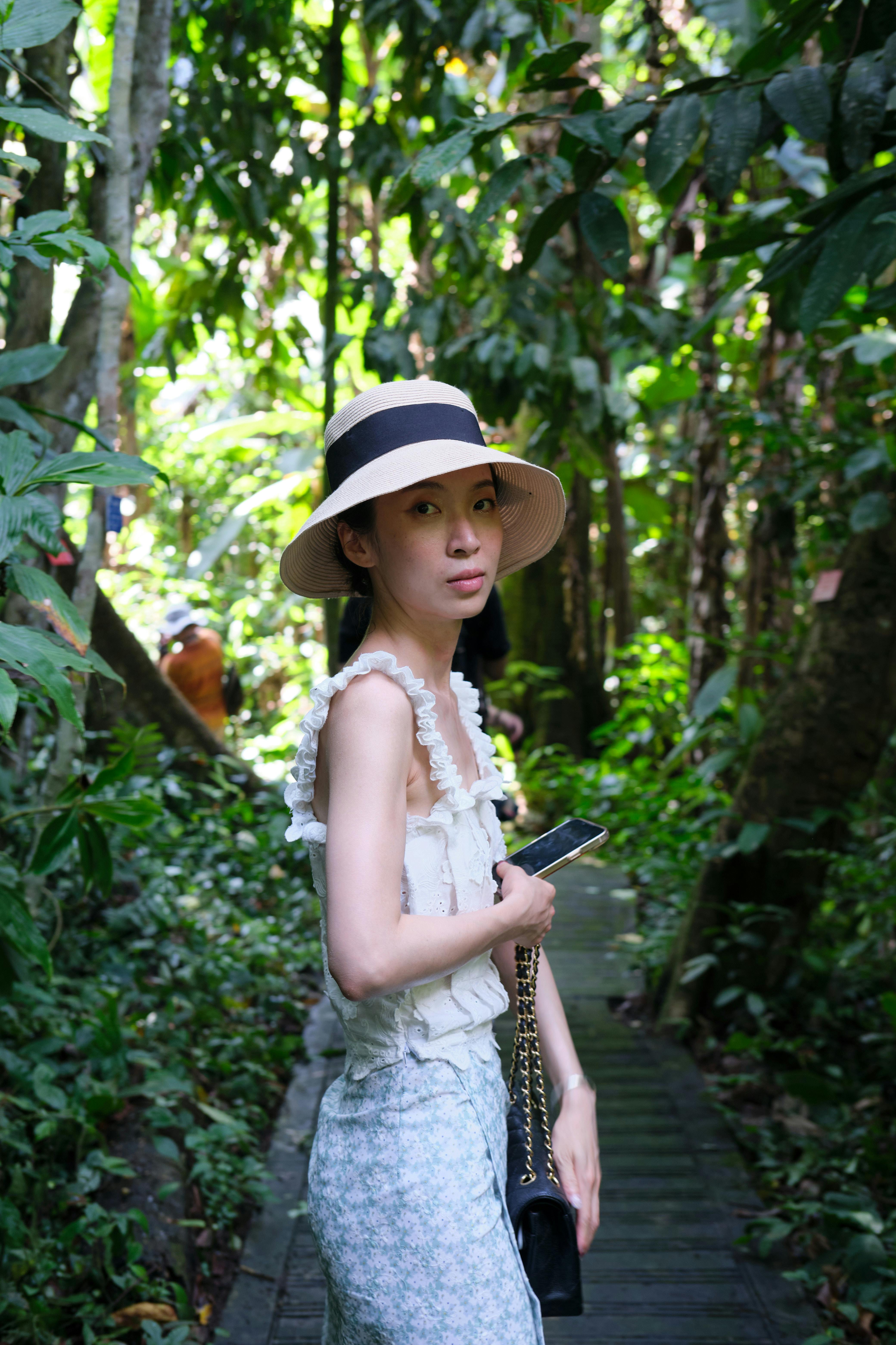 Cute Woman Walking in the Tropical Forest · Free Stock Photo