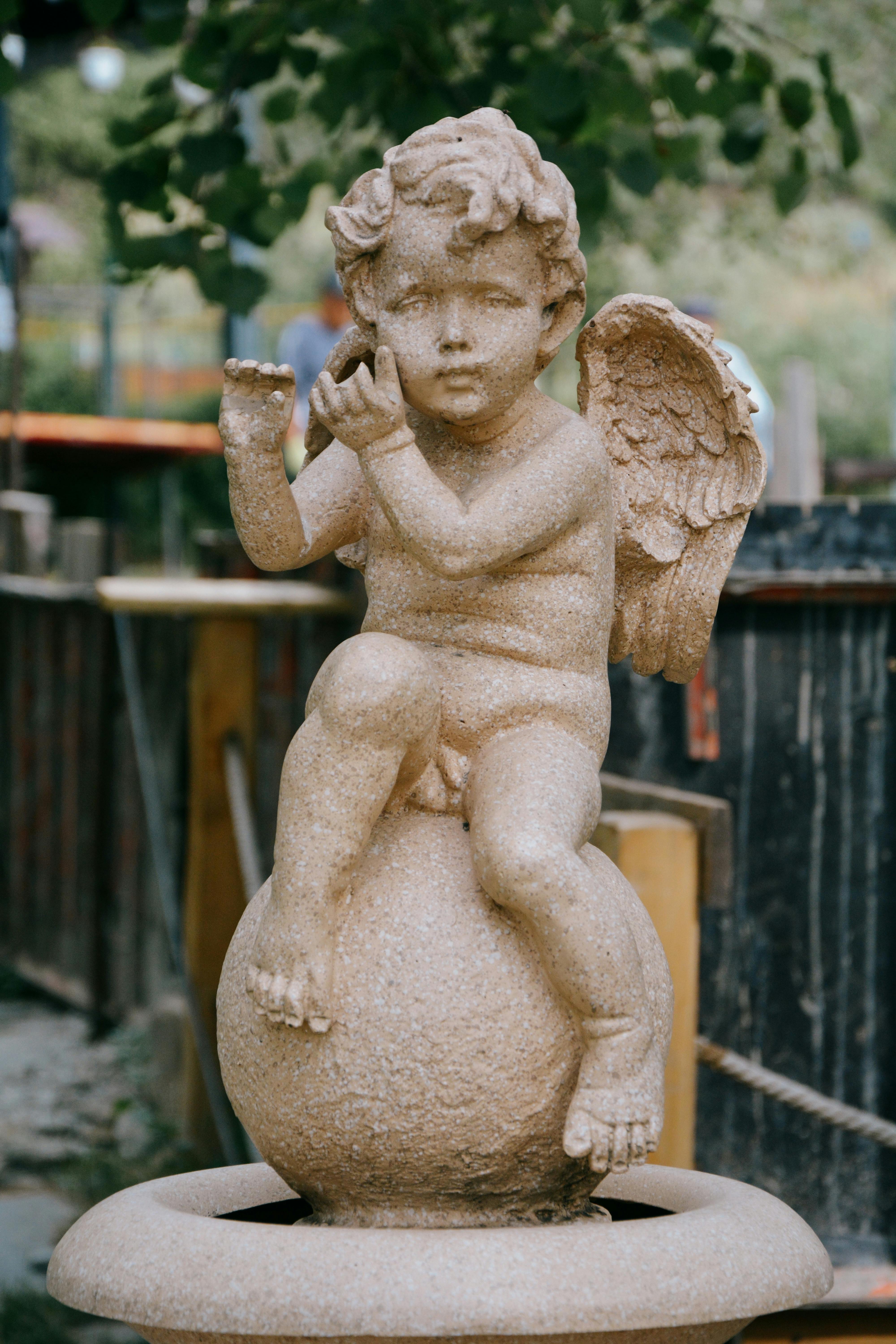 Statue of Baby Angel · Free Stock Photo