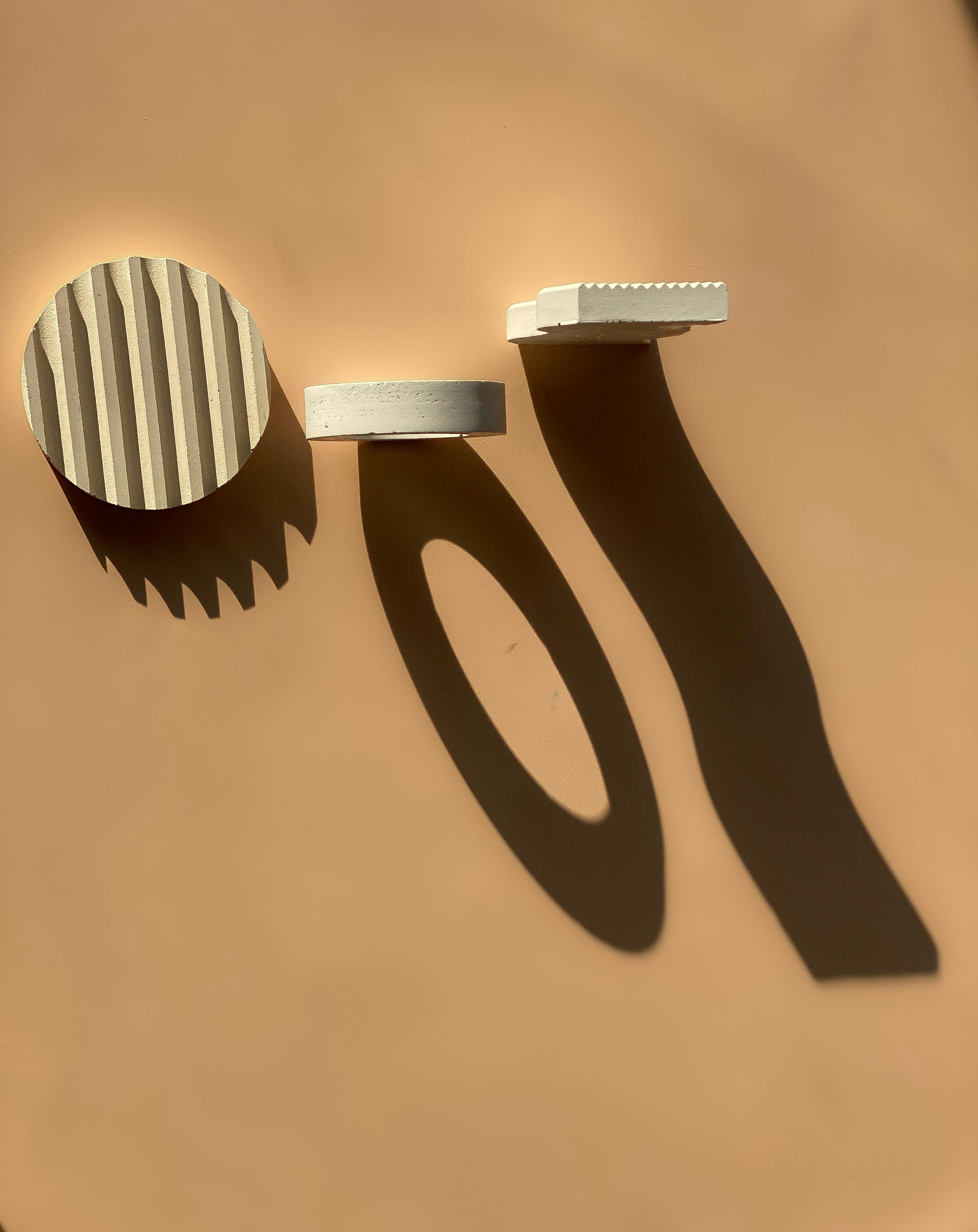 Items and Shadows on Sunlit Background · Free Stock Photo