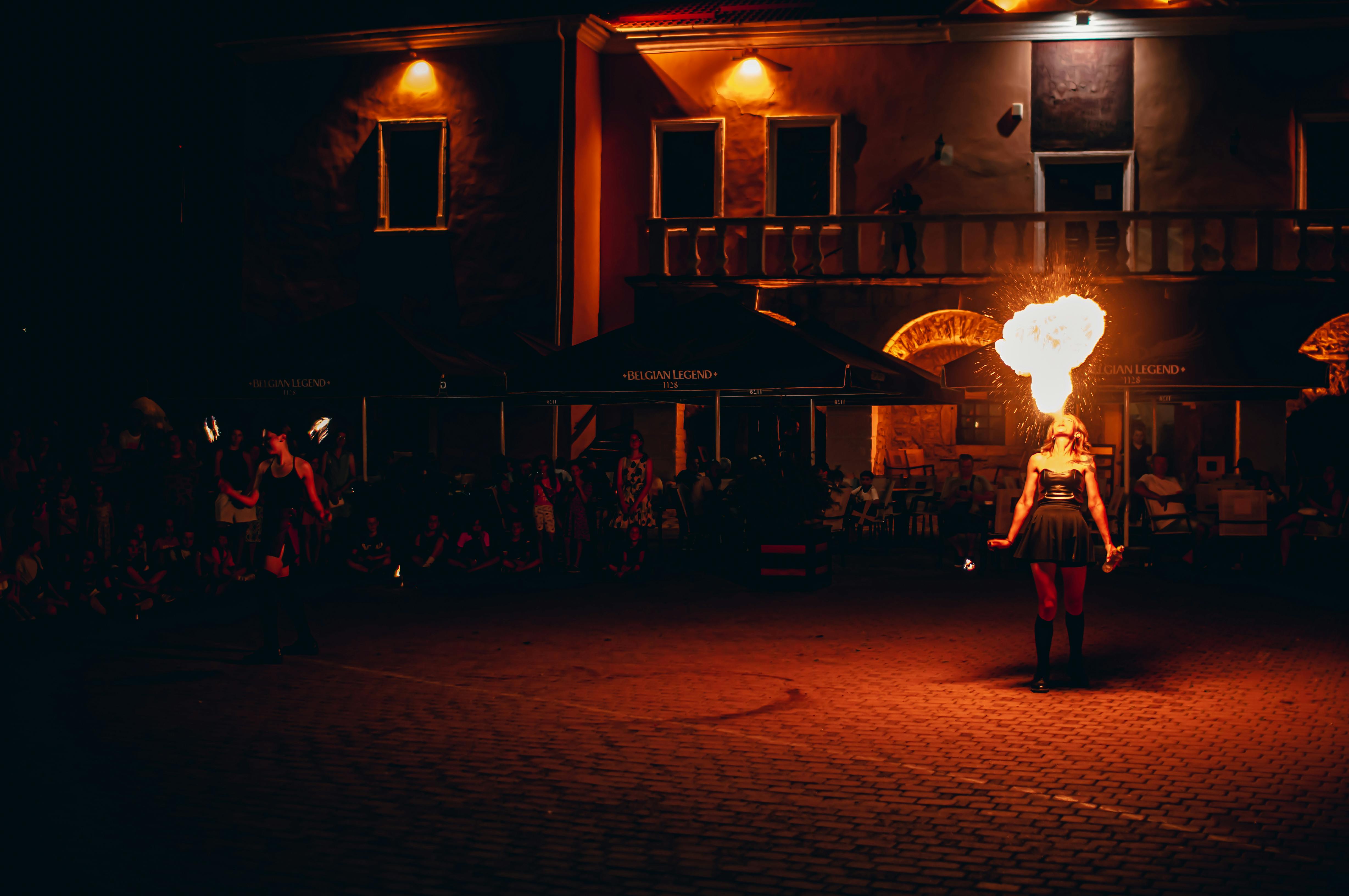 Man Spitting Fire at Night · Free Stock Photo