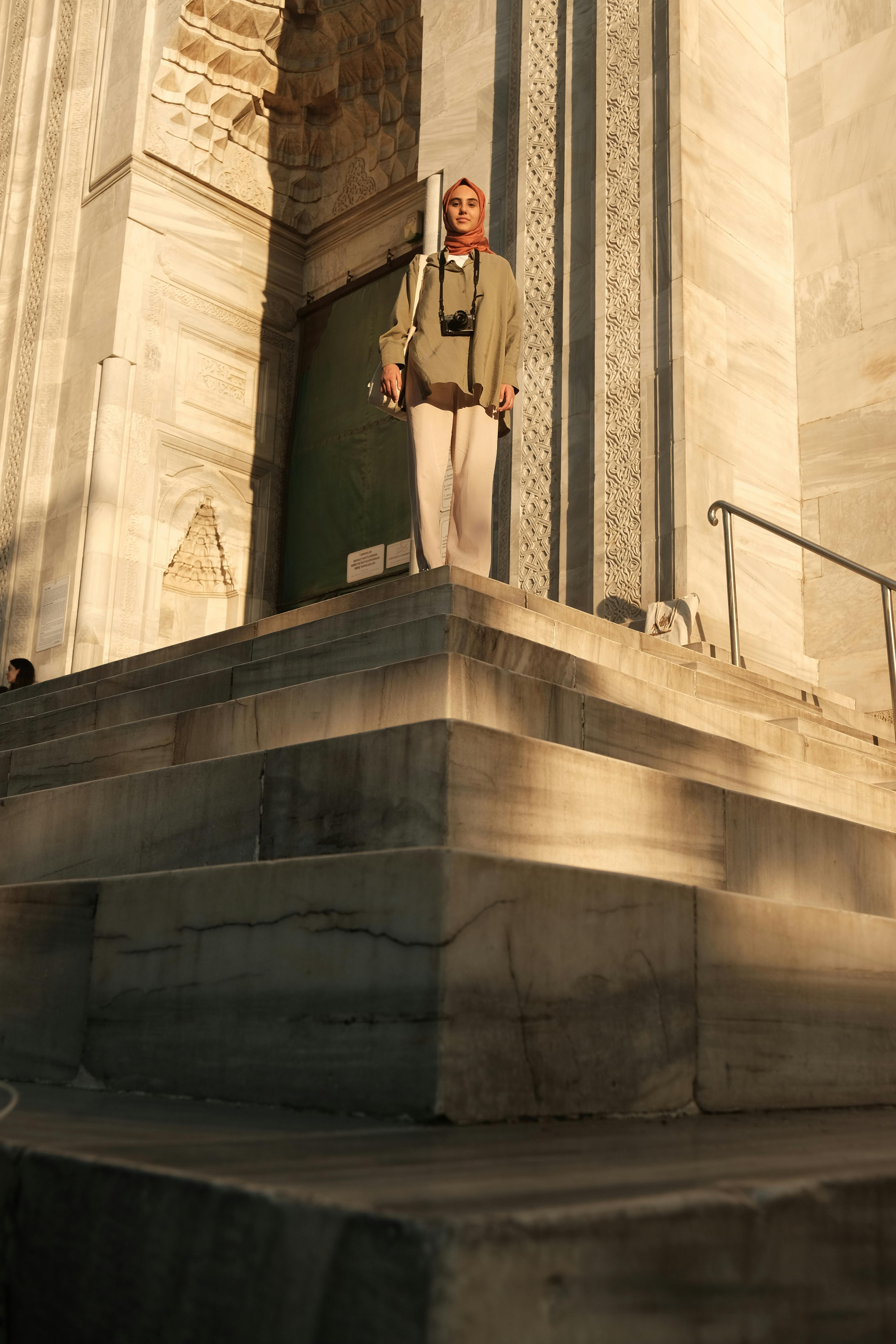 White Concrete Building Under White Clouds · Free Stock Photo