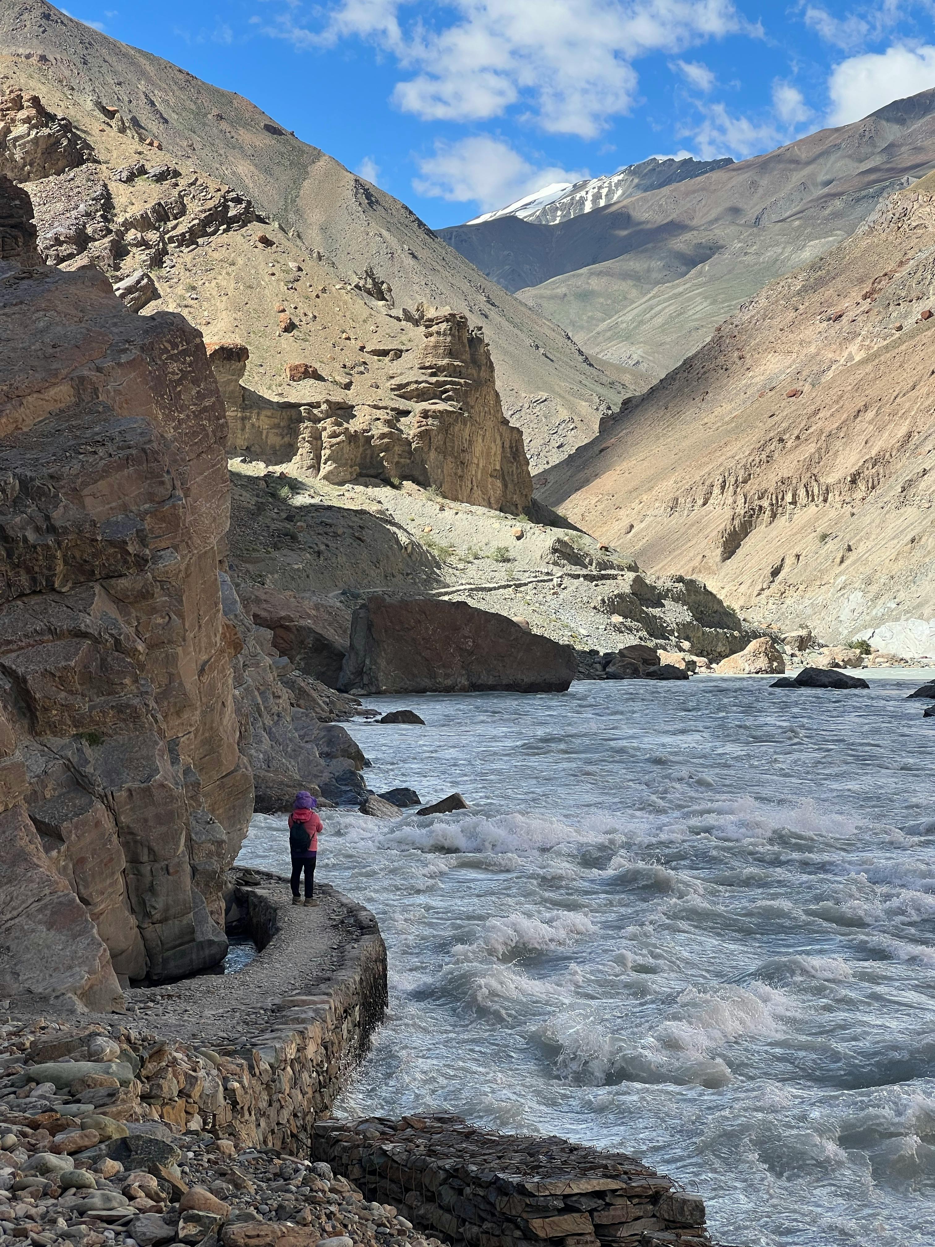 River Flowing in the Valley between Cliffs · Free Stock Photo