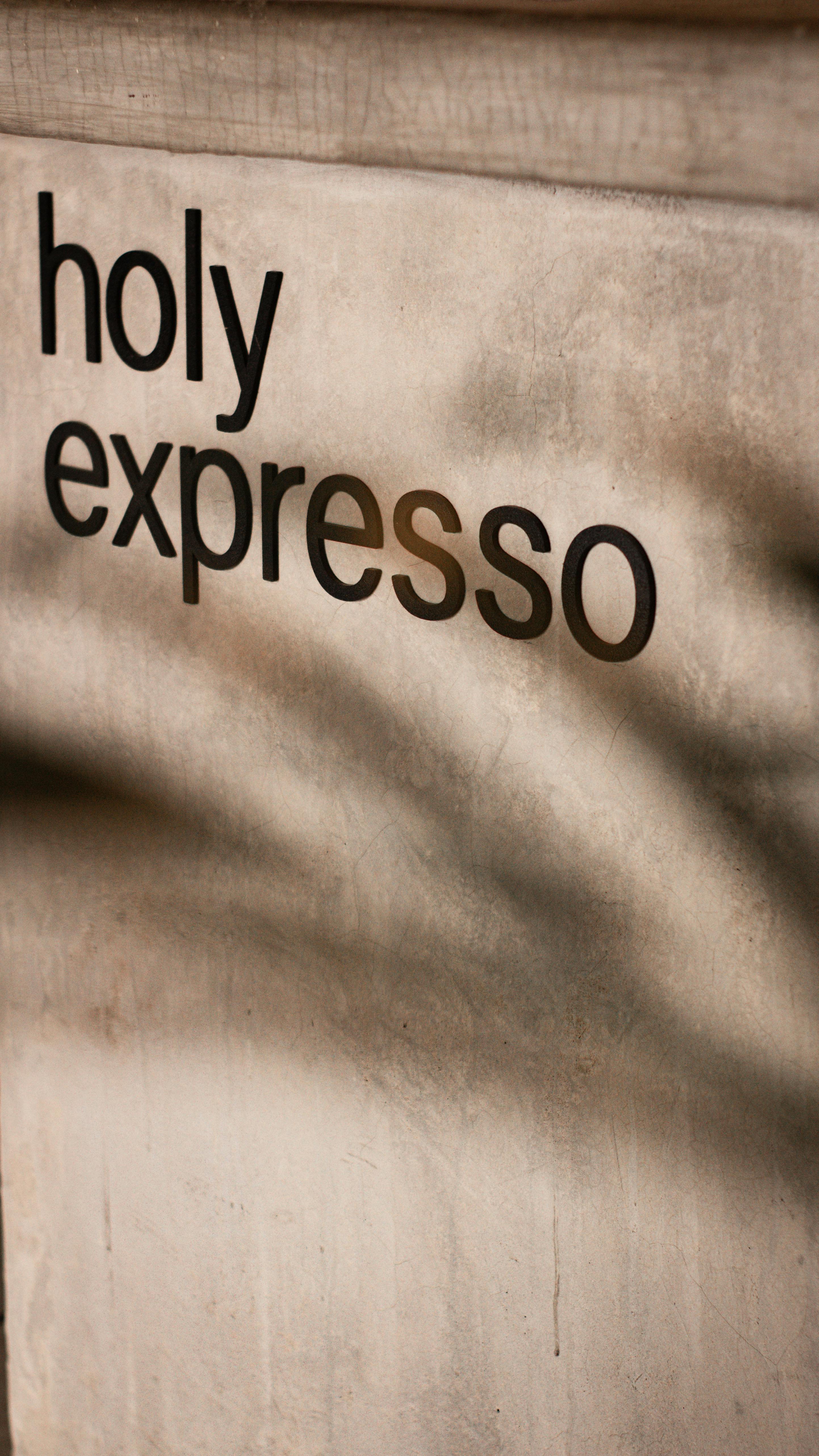 Sign on Concrete Wall · Free Stock Photo