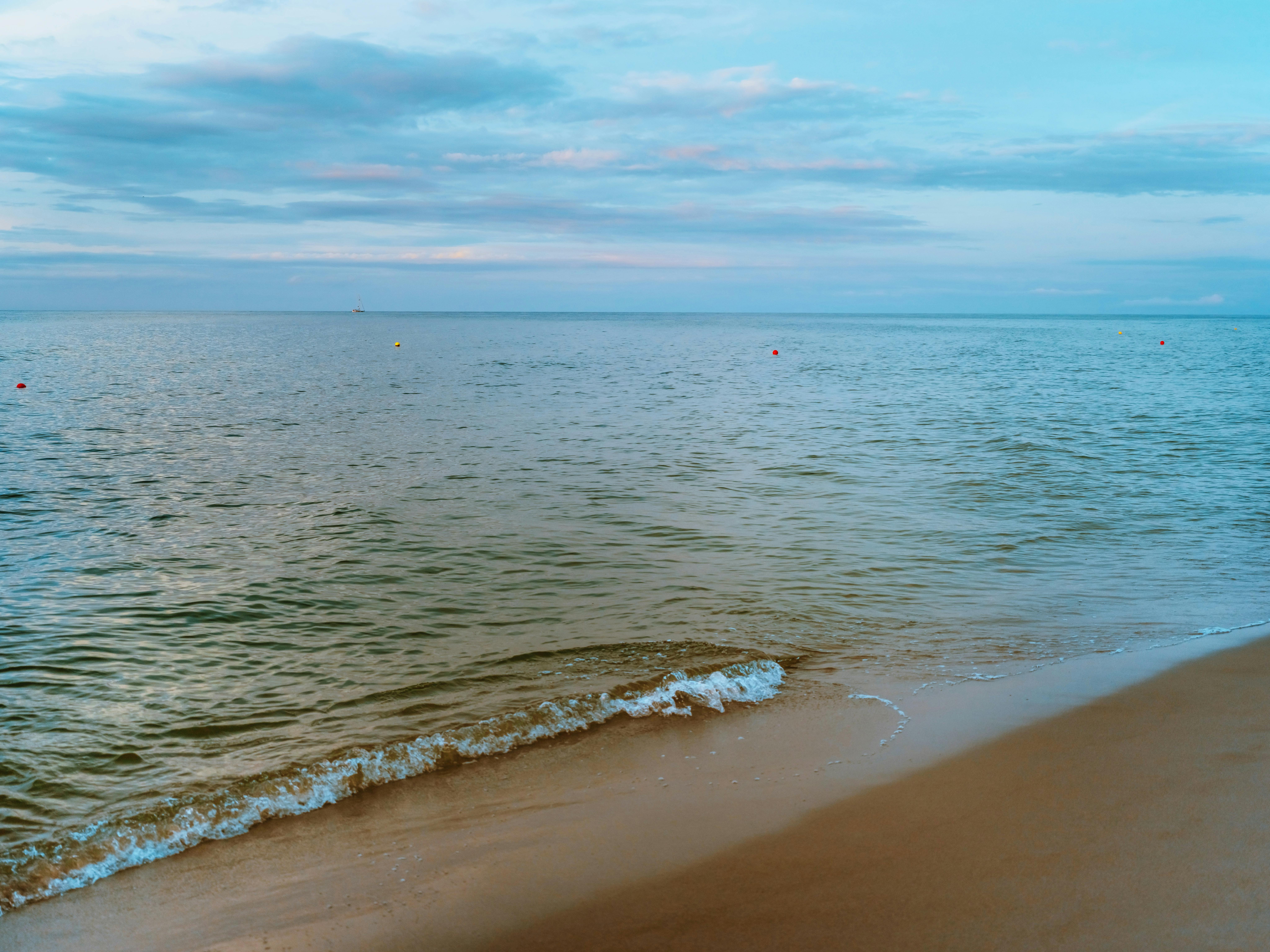 Photo of Calm Sea at Daytime · Free Stock Photo