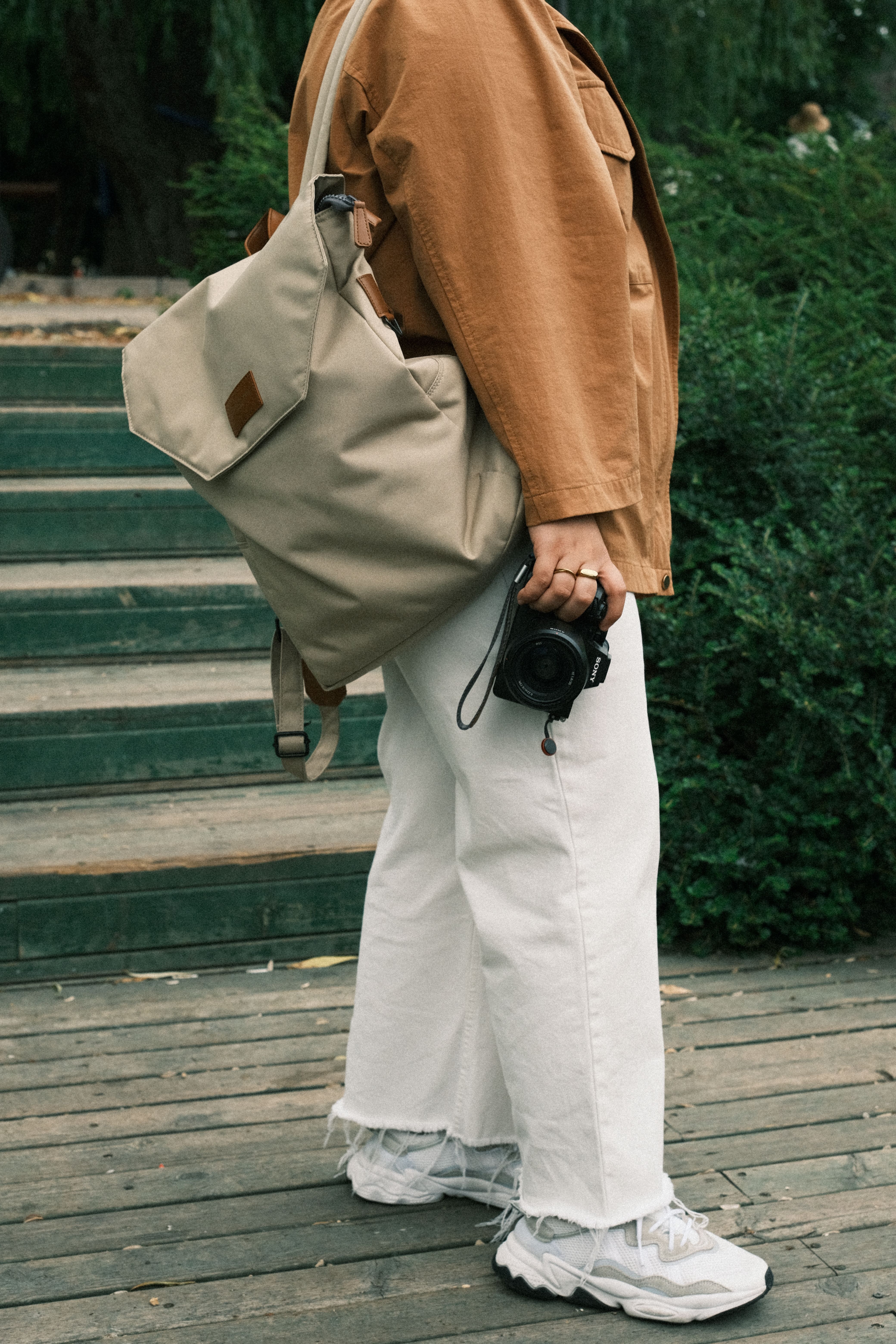 Standing Person with Camera and Backpack · Free Stock Photo