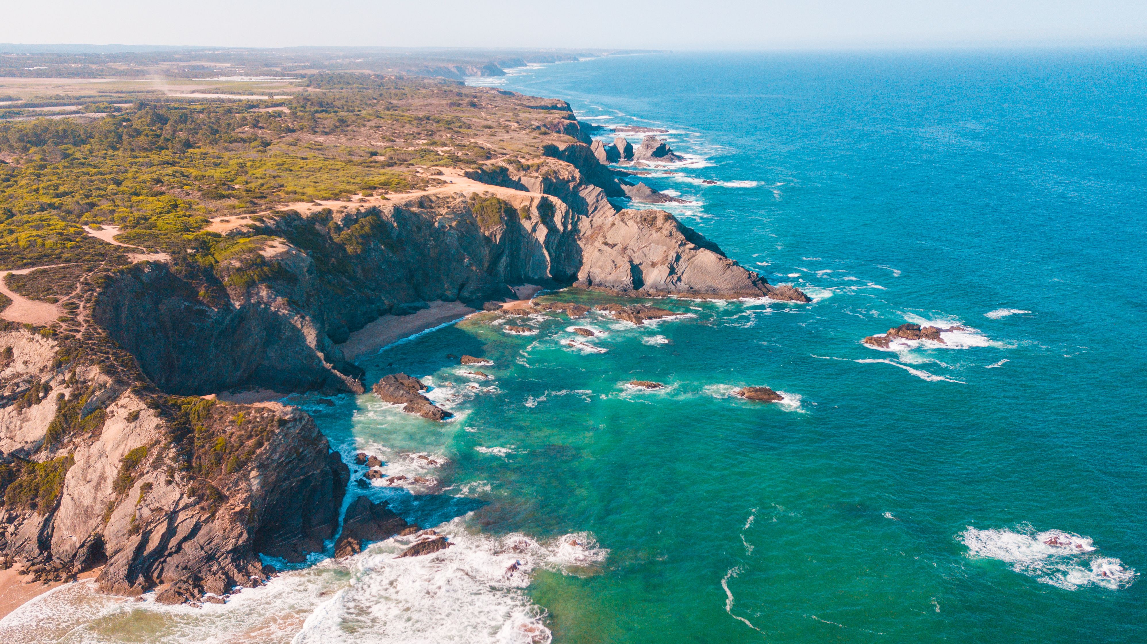 Rocky Cliff Over the Ocean · Free Stock Photo