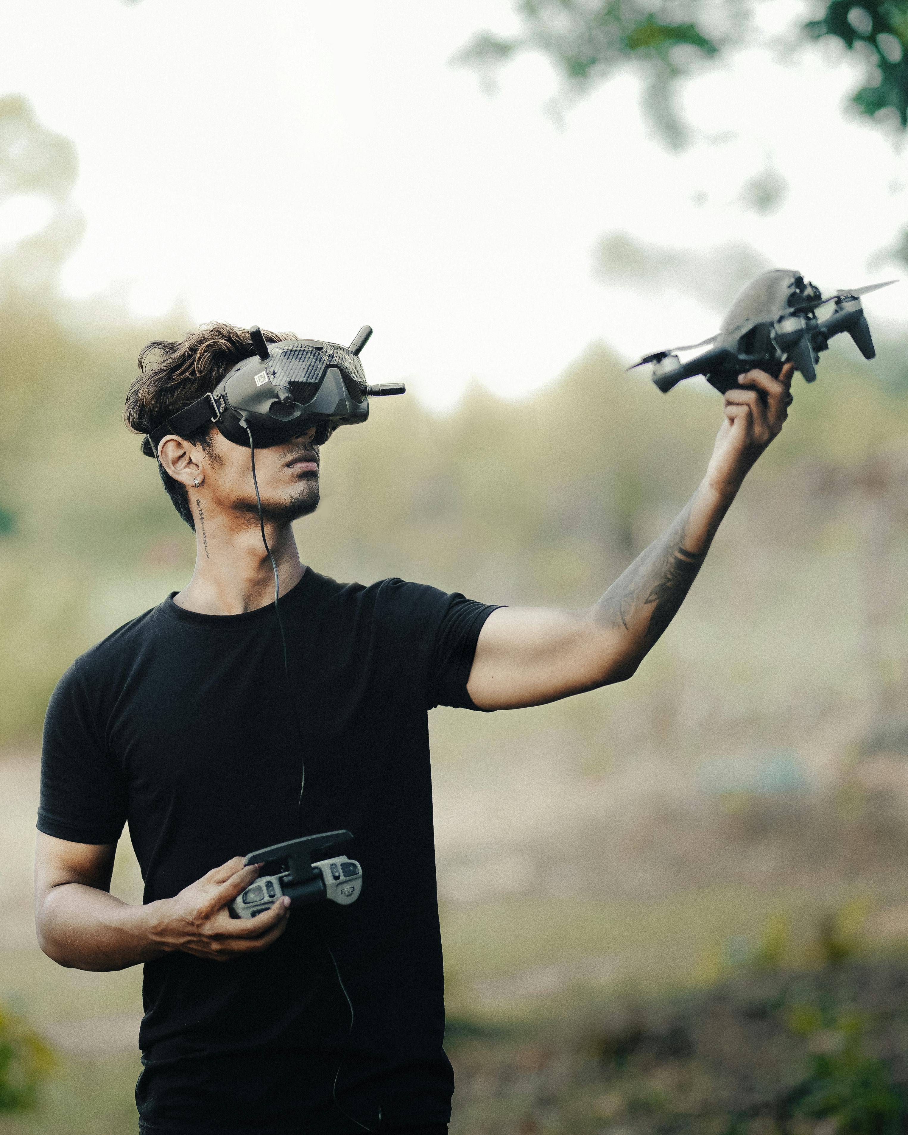 Man with Headset and Drone · Free Stock Photo