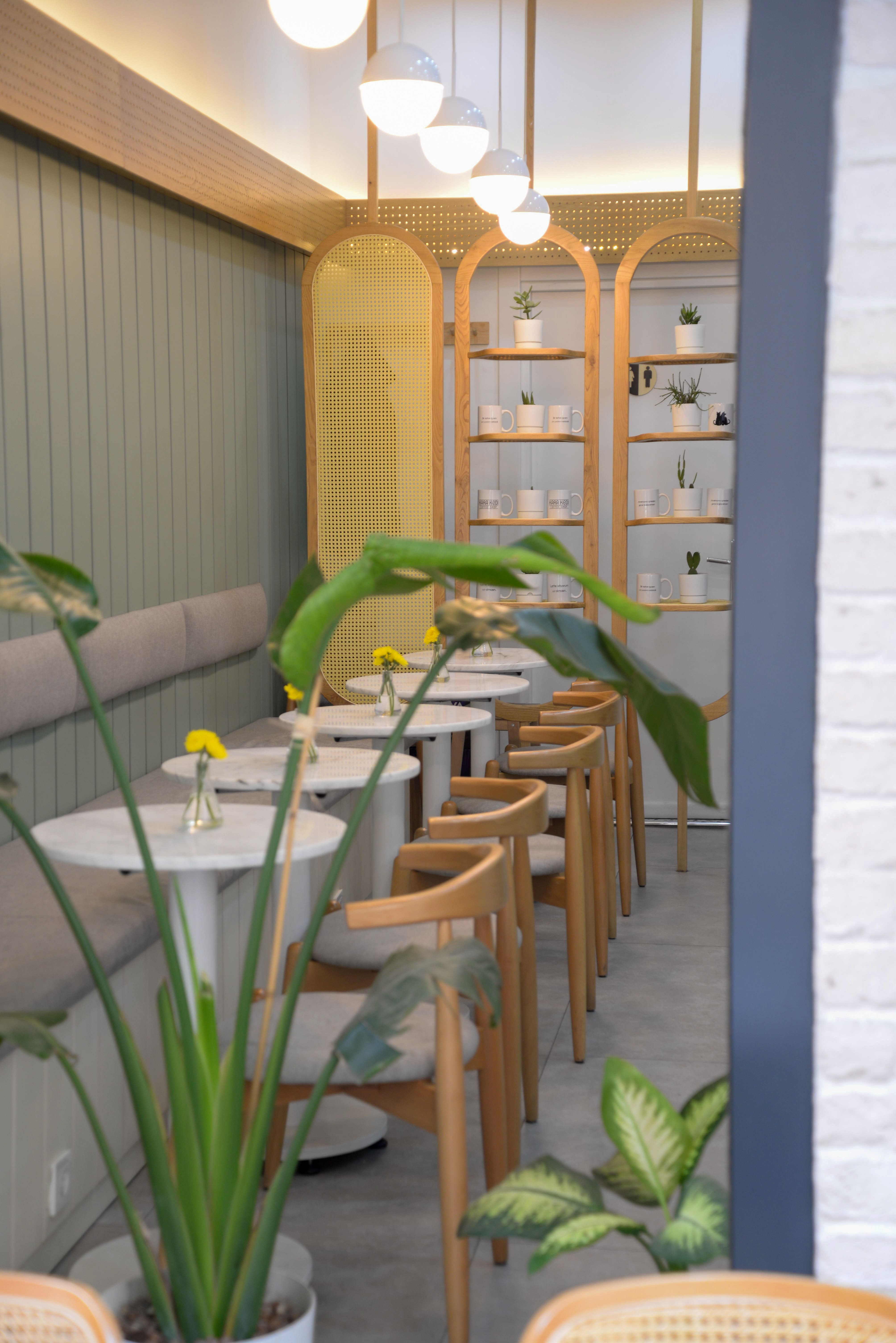 Tables and Chairs in a Coffee Shop · Free Stock Photo
