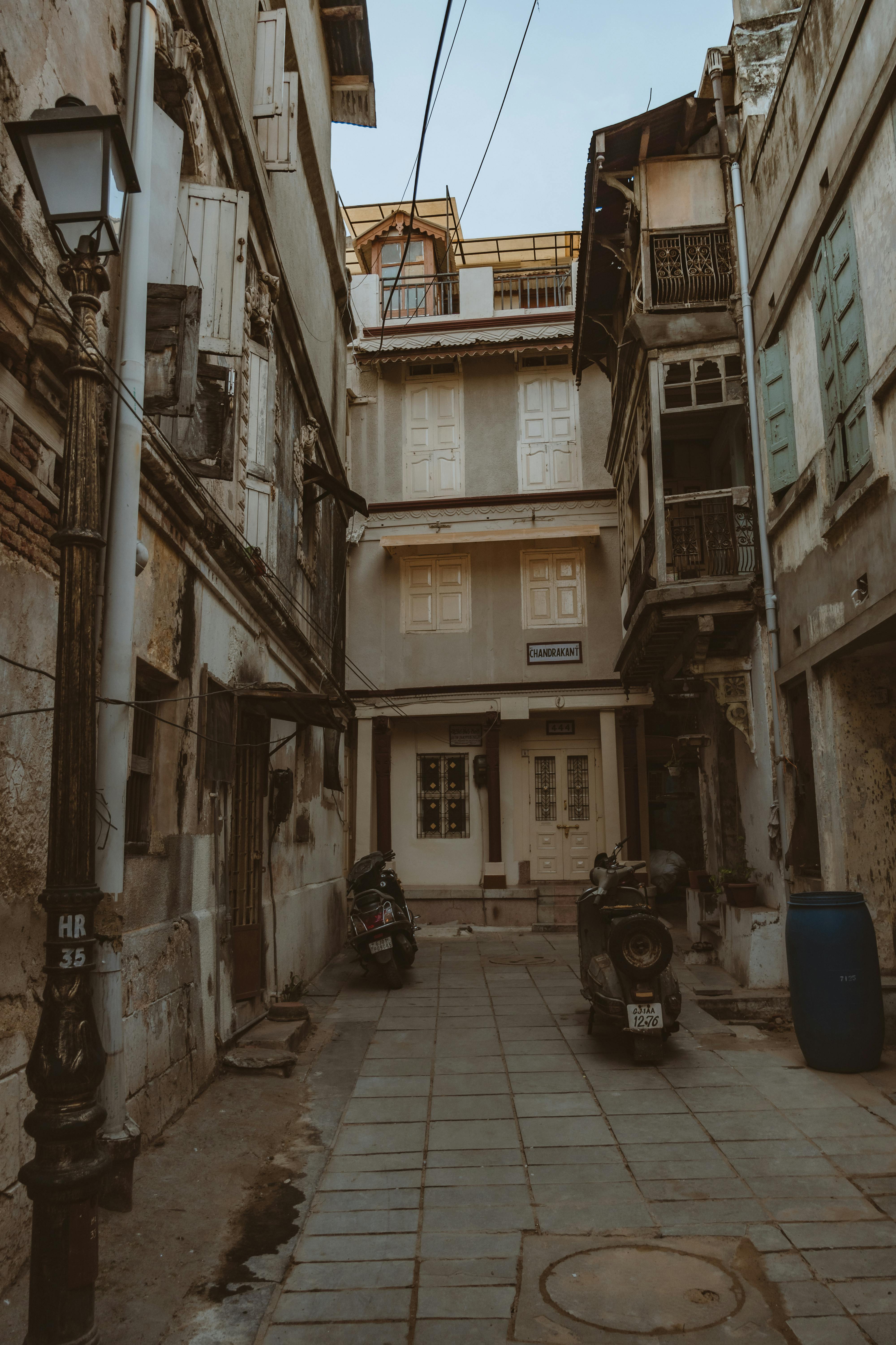 Alley with Buildings in Town · Free Stock Photo