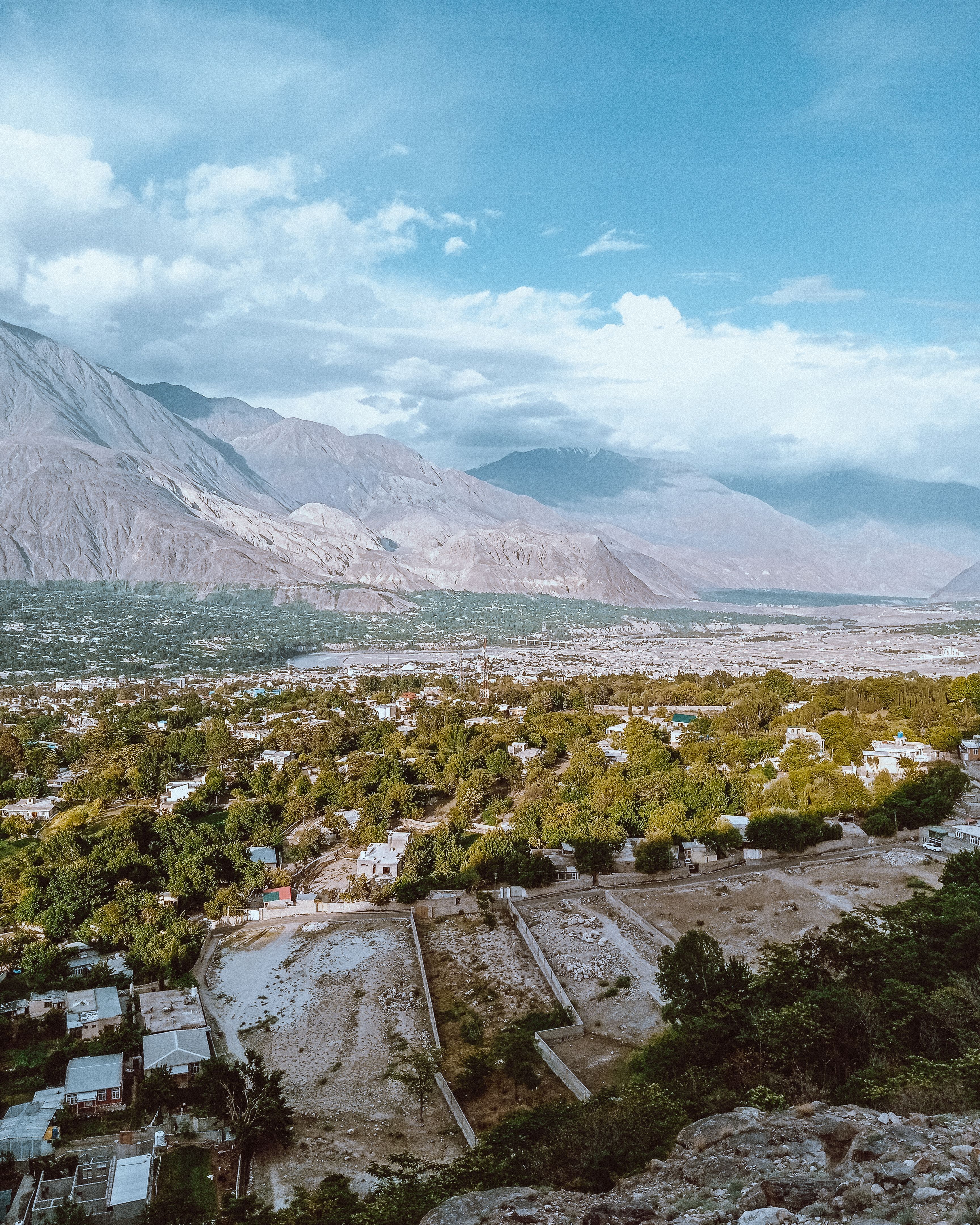 Aerial View of a Village in a Mountain Valley · Free Stock Photo