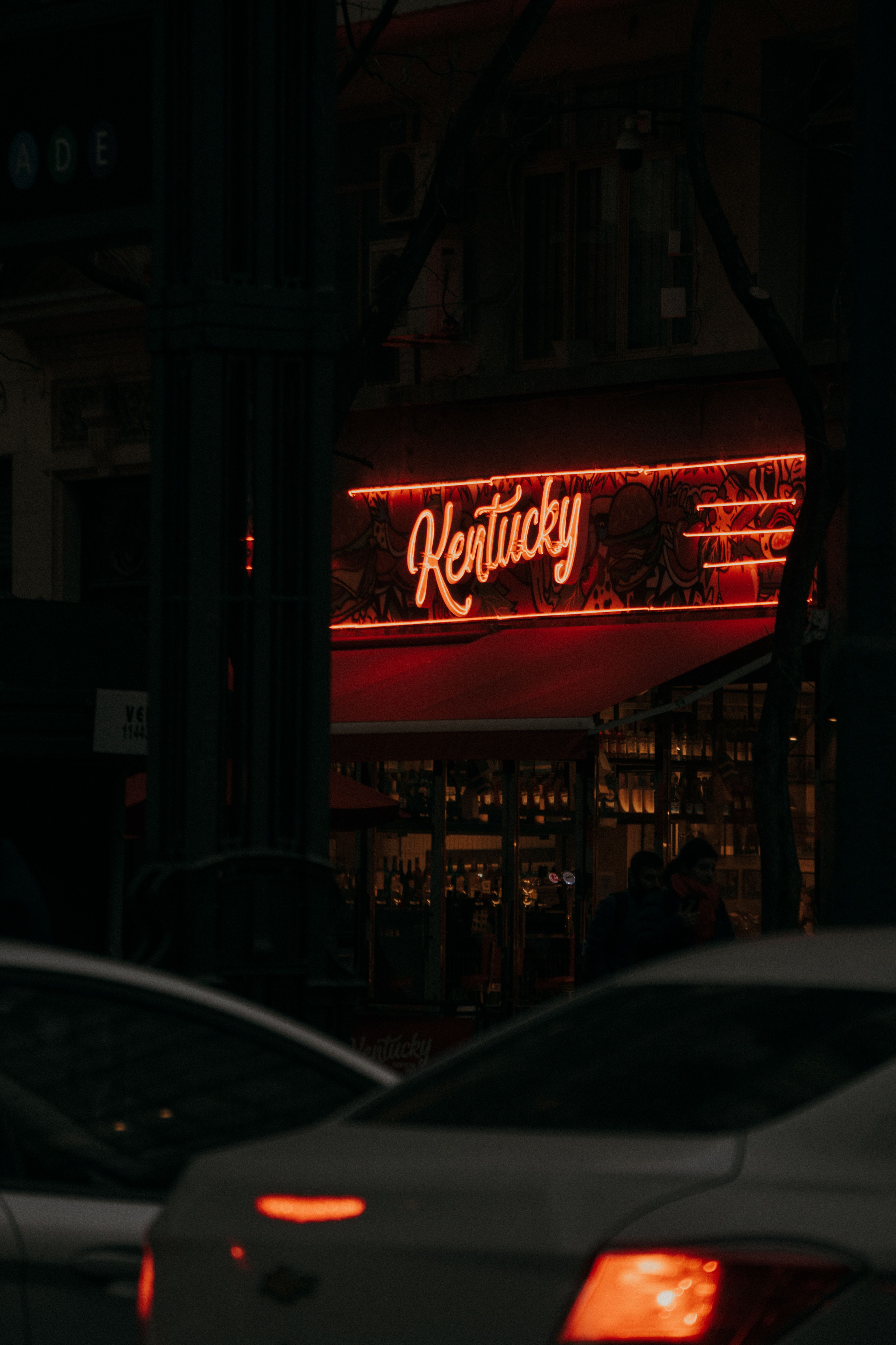 Red Neon Light on Road Bar Facade · Free Stock Photo