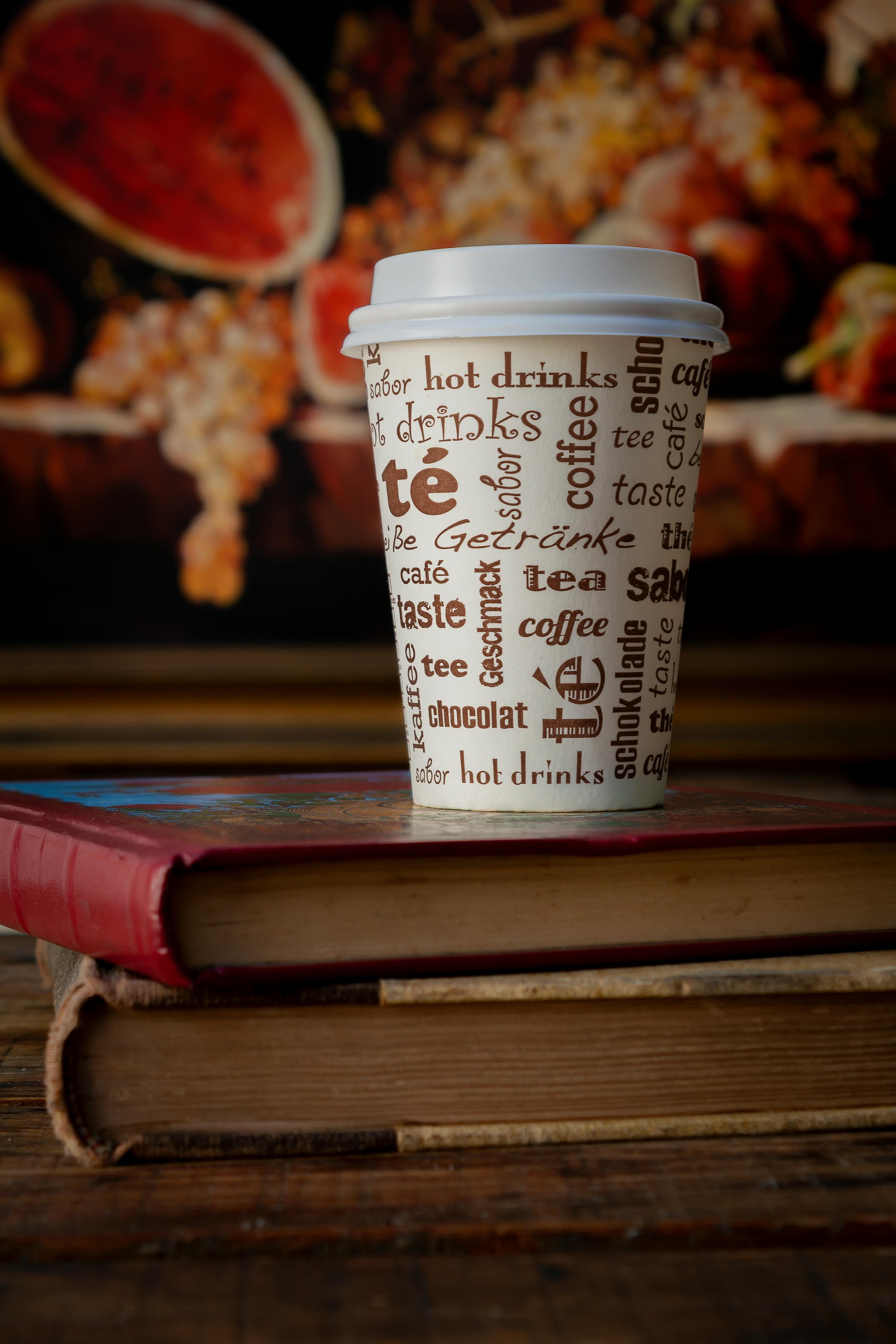 Coffee Cup on Books · Free Stock Photo