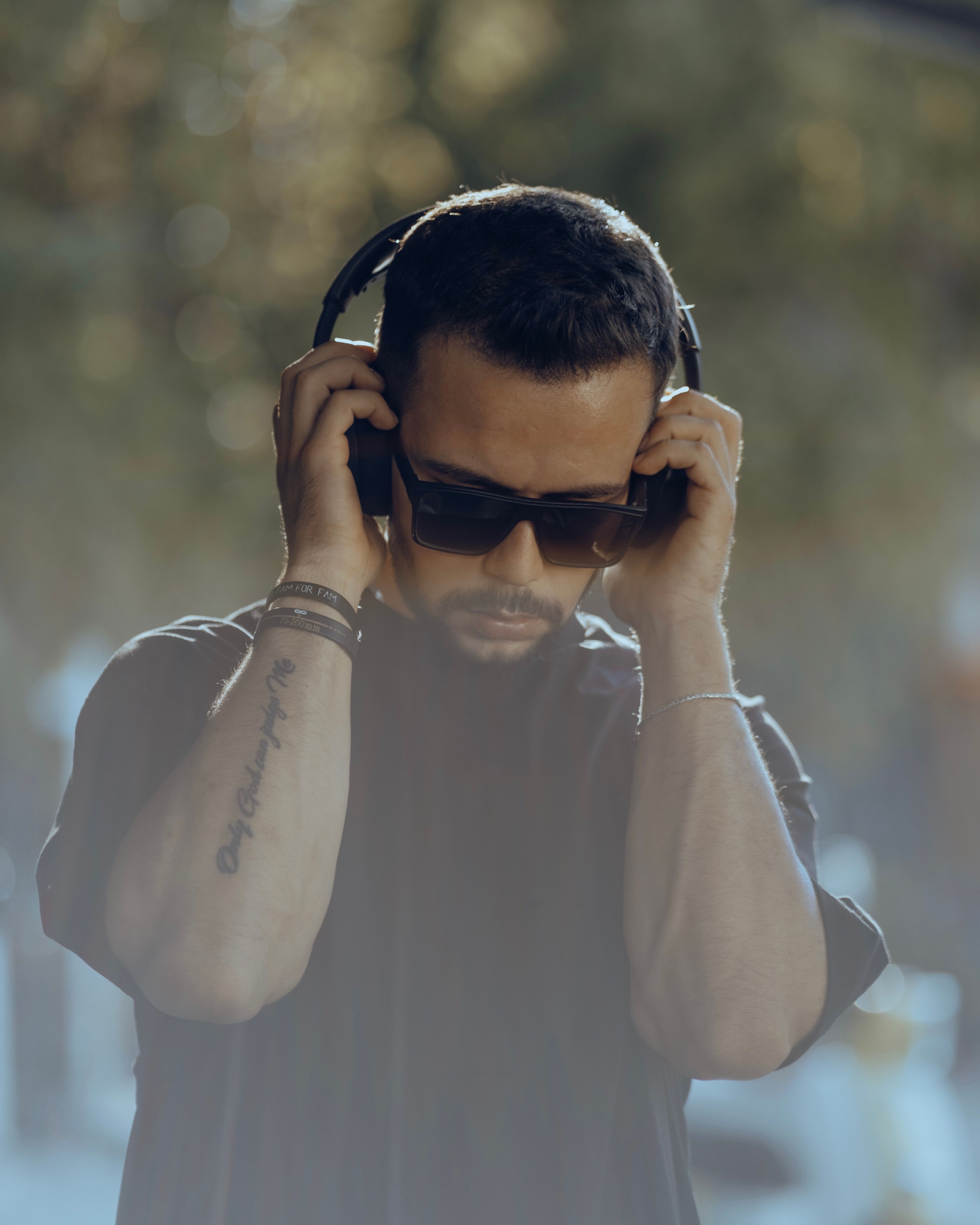 Funky Man with Headphones Making Hearing Gesture · Free Stock Photo