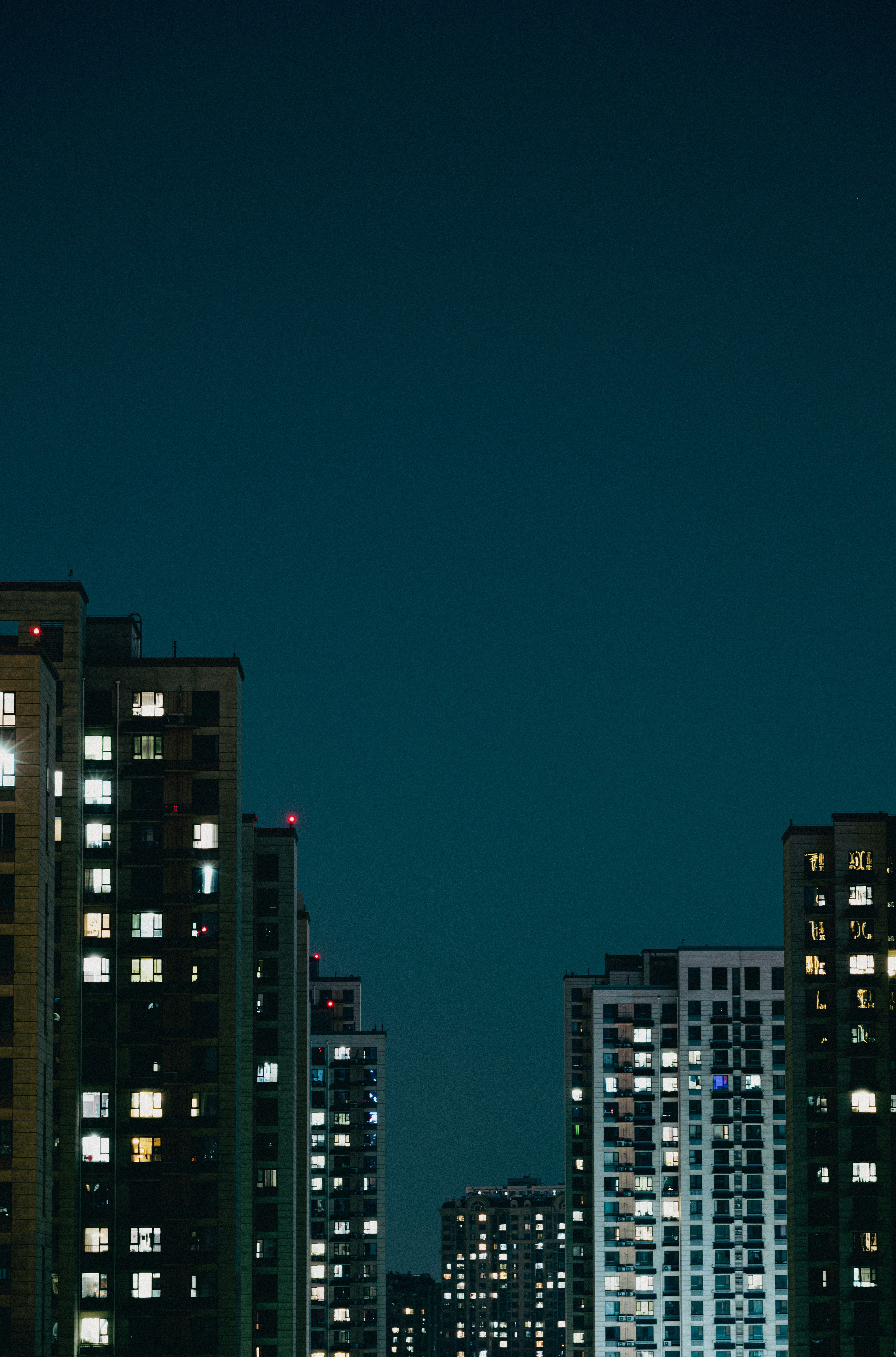 House Buildings at Night · Free Stock Photo