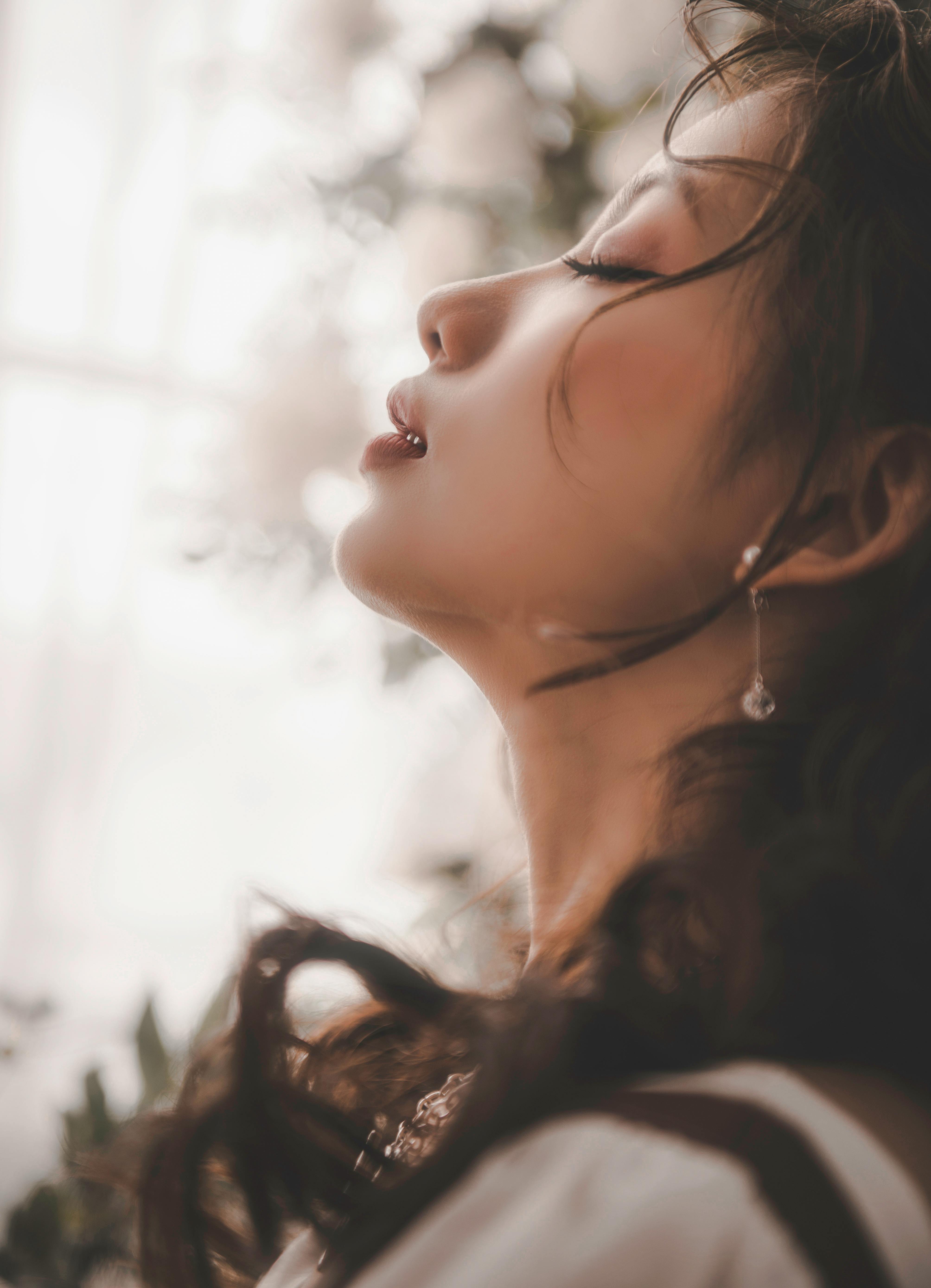 Brunette Woman with Closed Eyes · Free Stock Photo