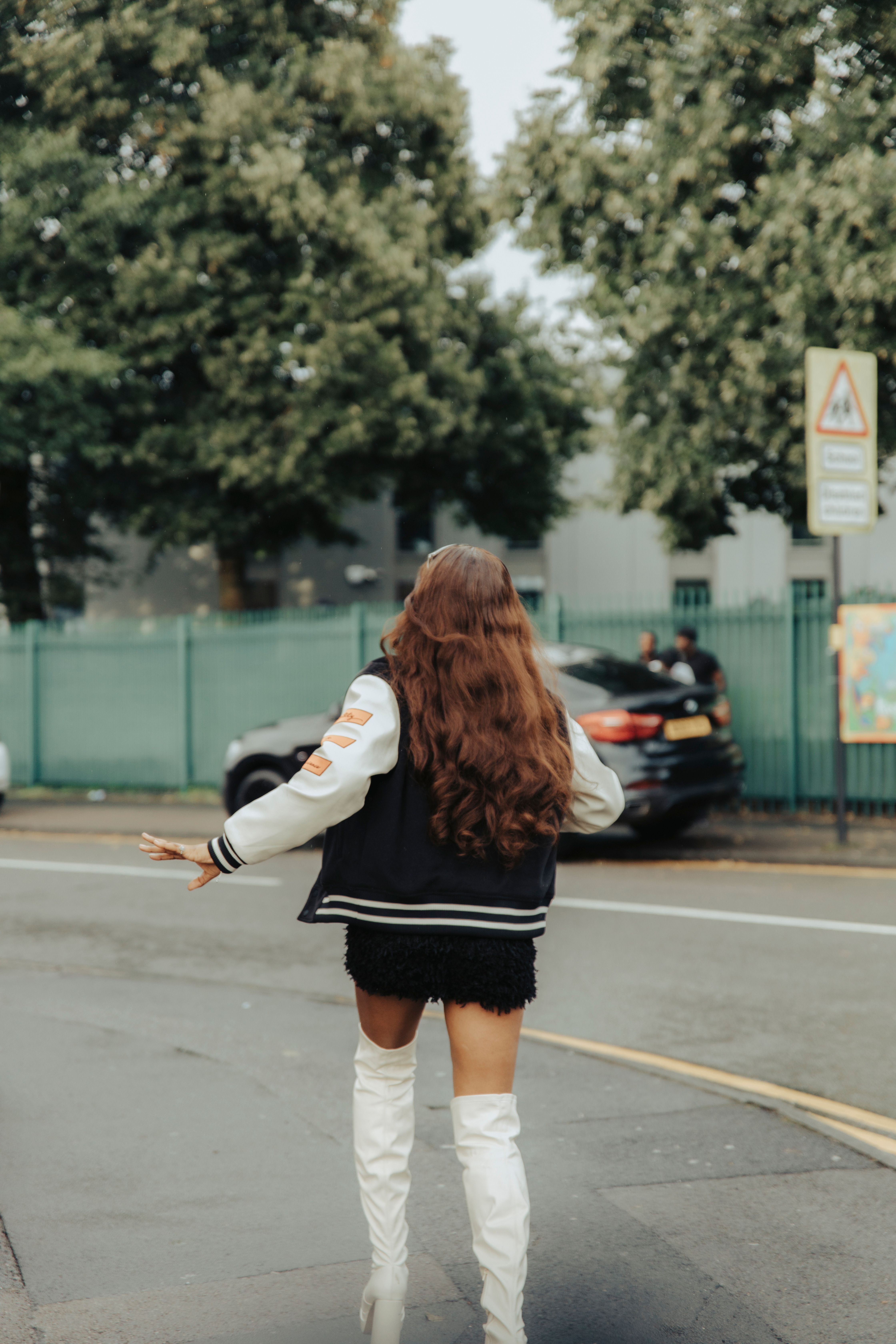 Woman in Black Mini Skirt, Over Knees Boots and Shades · Free Stock Photo