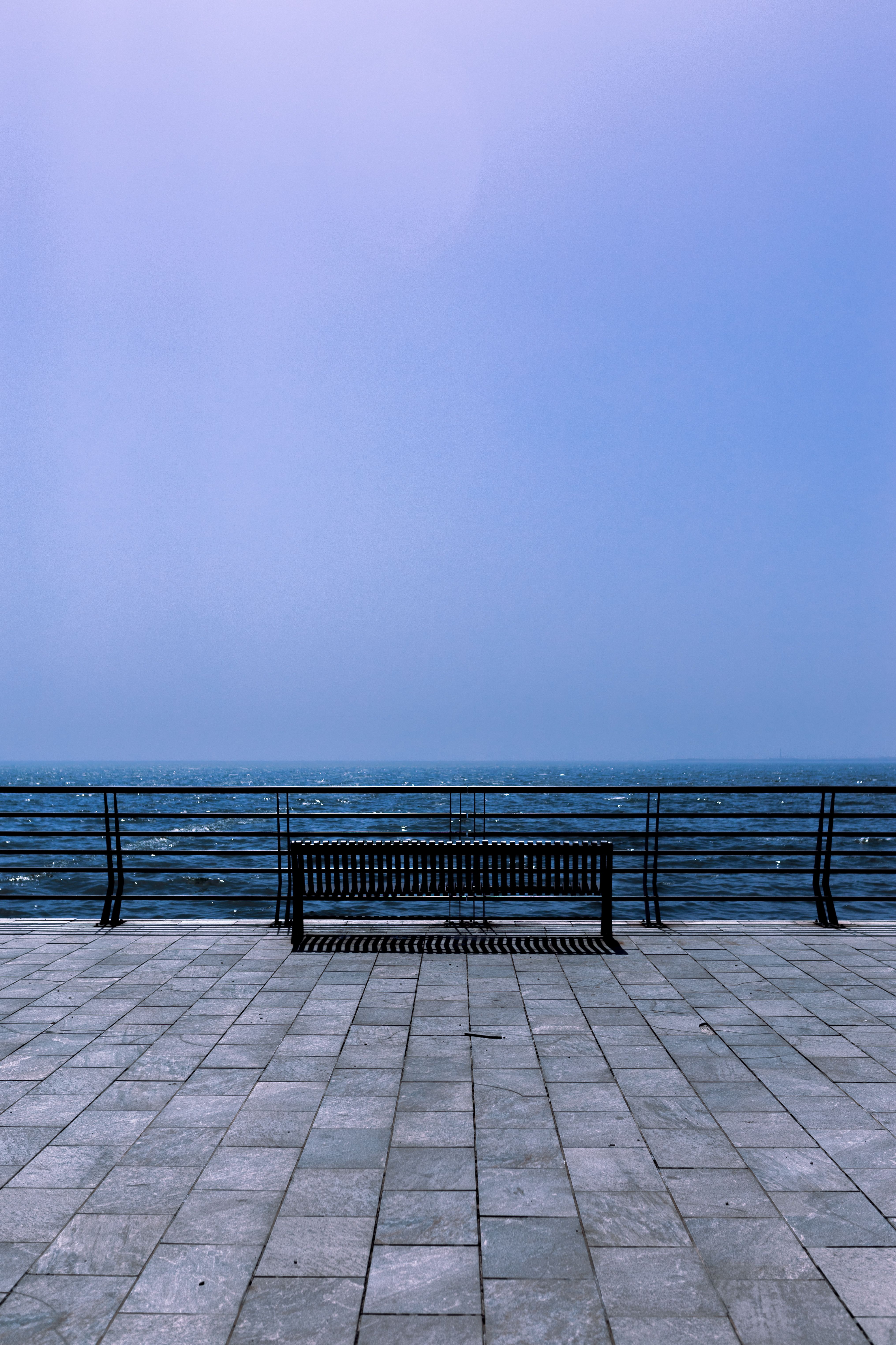 Bench on a Pier by the Sea · Free Stock Photo