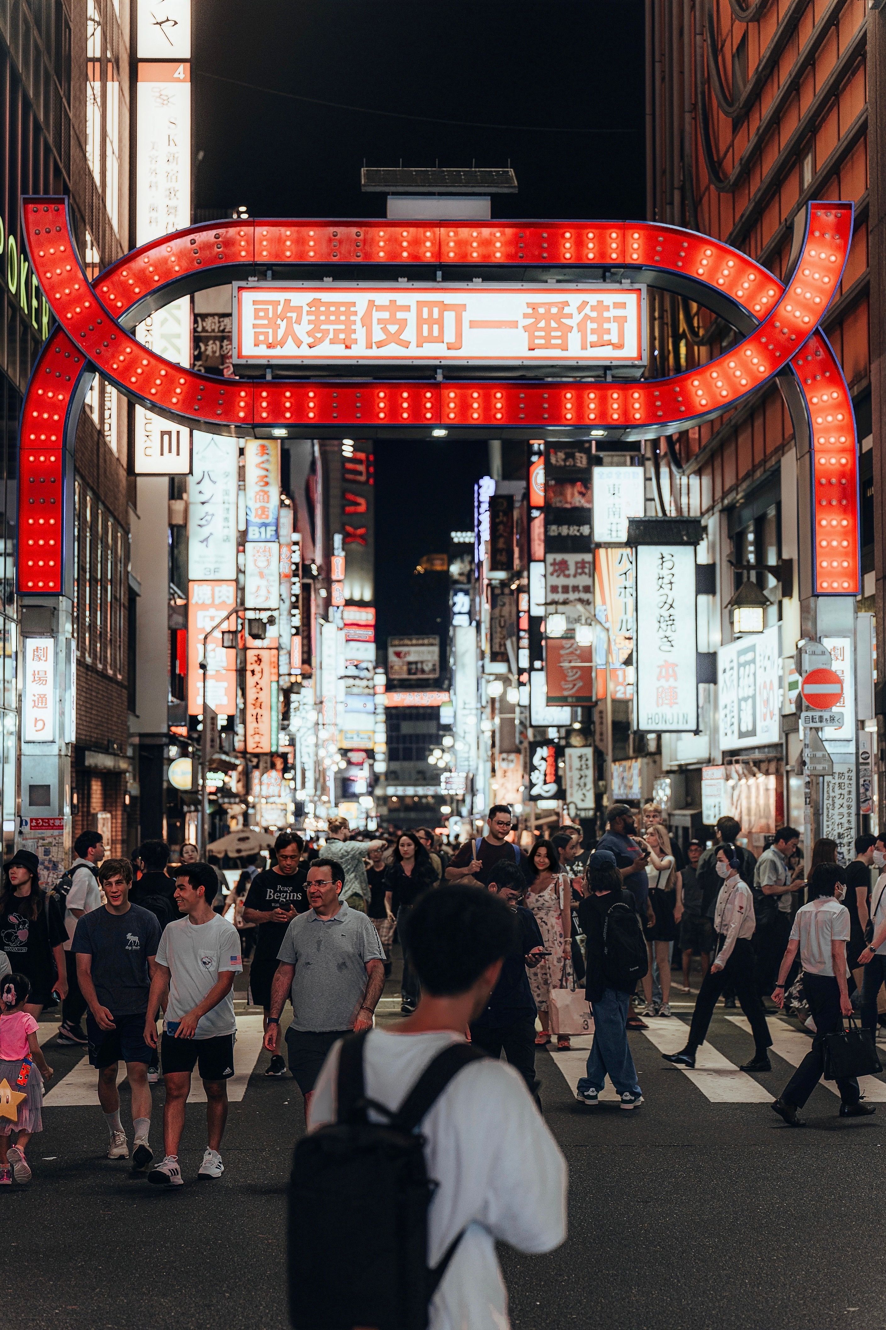 View of a Crowded Street and Illuminated Buildings in Shinjuku, Tokyo ...