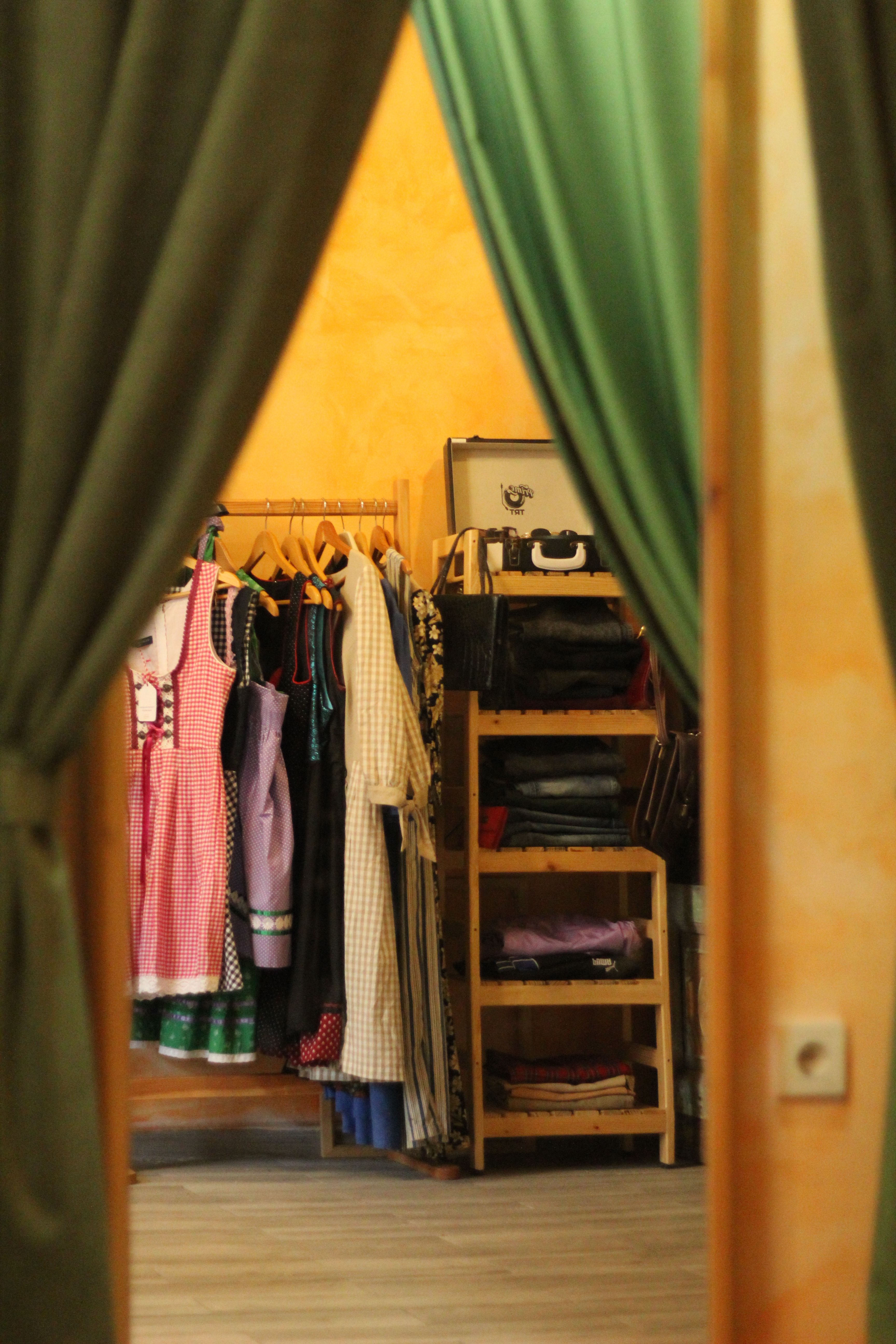 Clothes and Shelves behind Curtains · Free Stock Photo