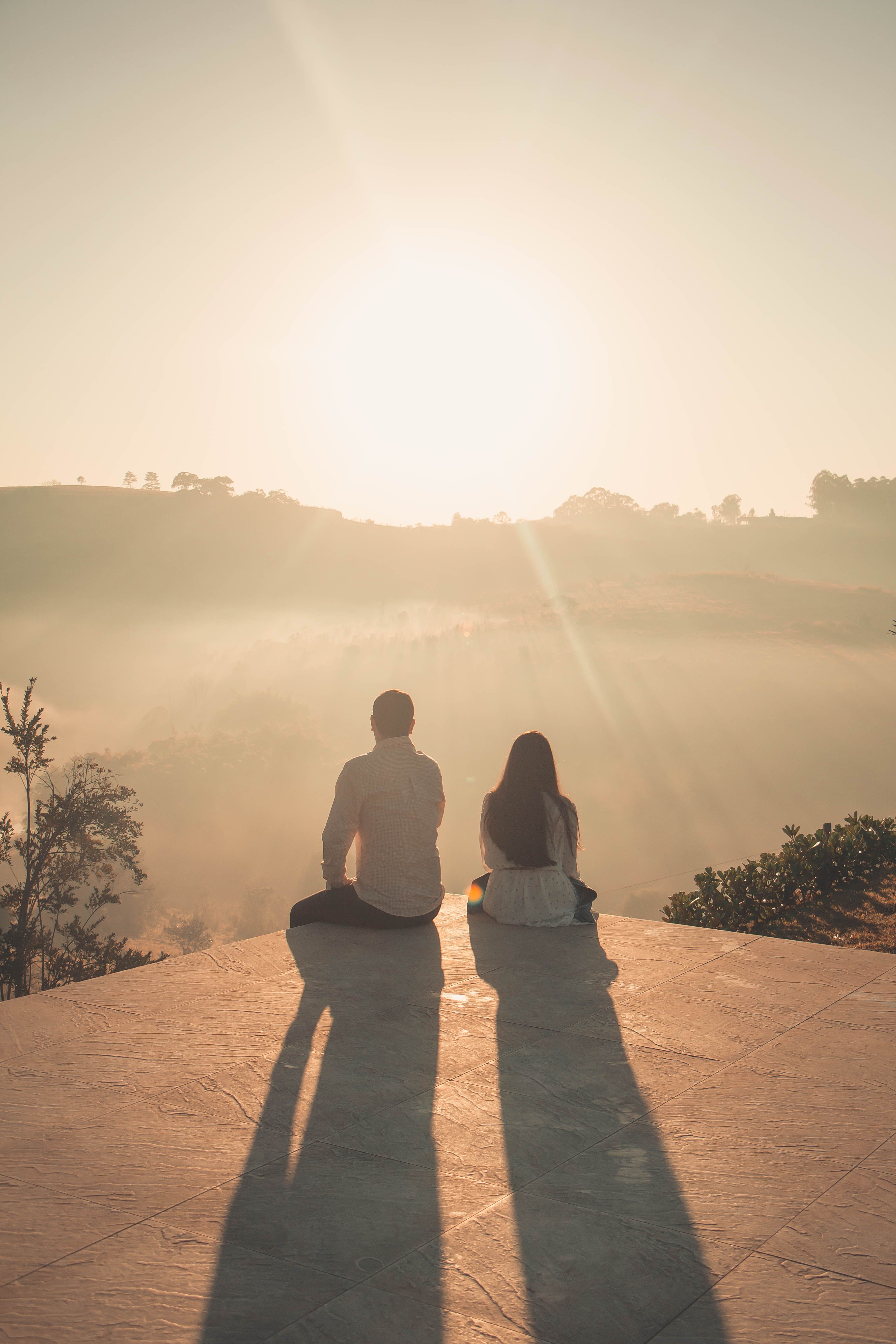 Couple Look at Hazy Air over Valley · Free Stock Photo