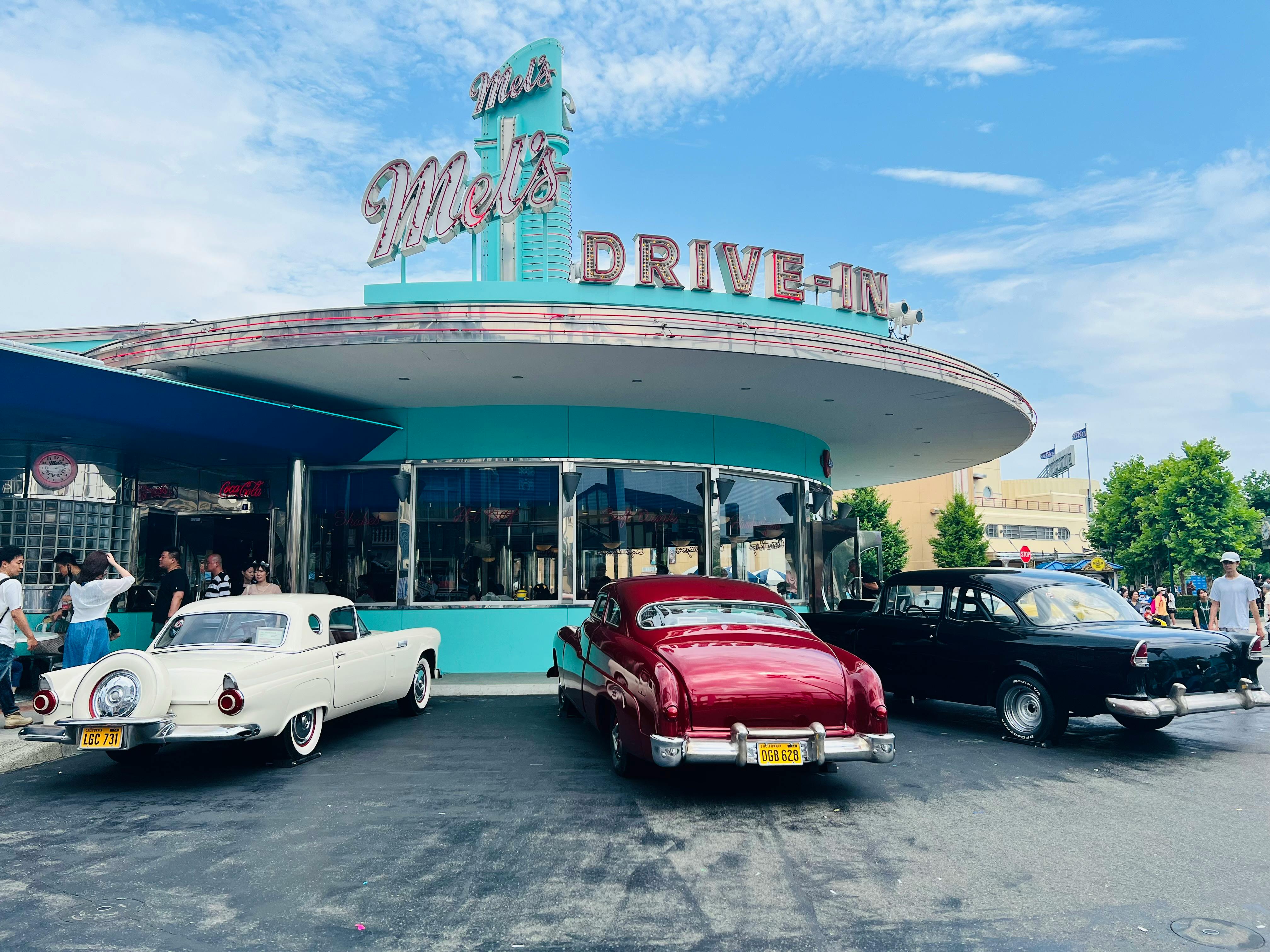 Vintage Cars Parked by Bar · Free Stock Photo
